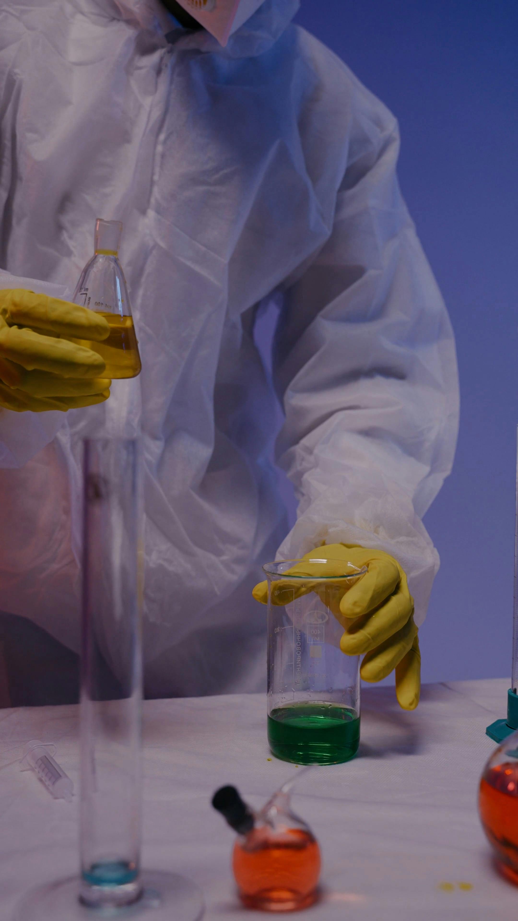 Man Transferring Liquids to the Beaker Free Stock Video Footage ...