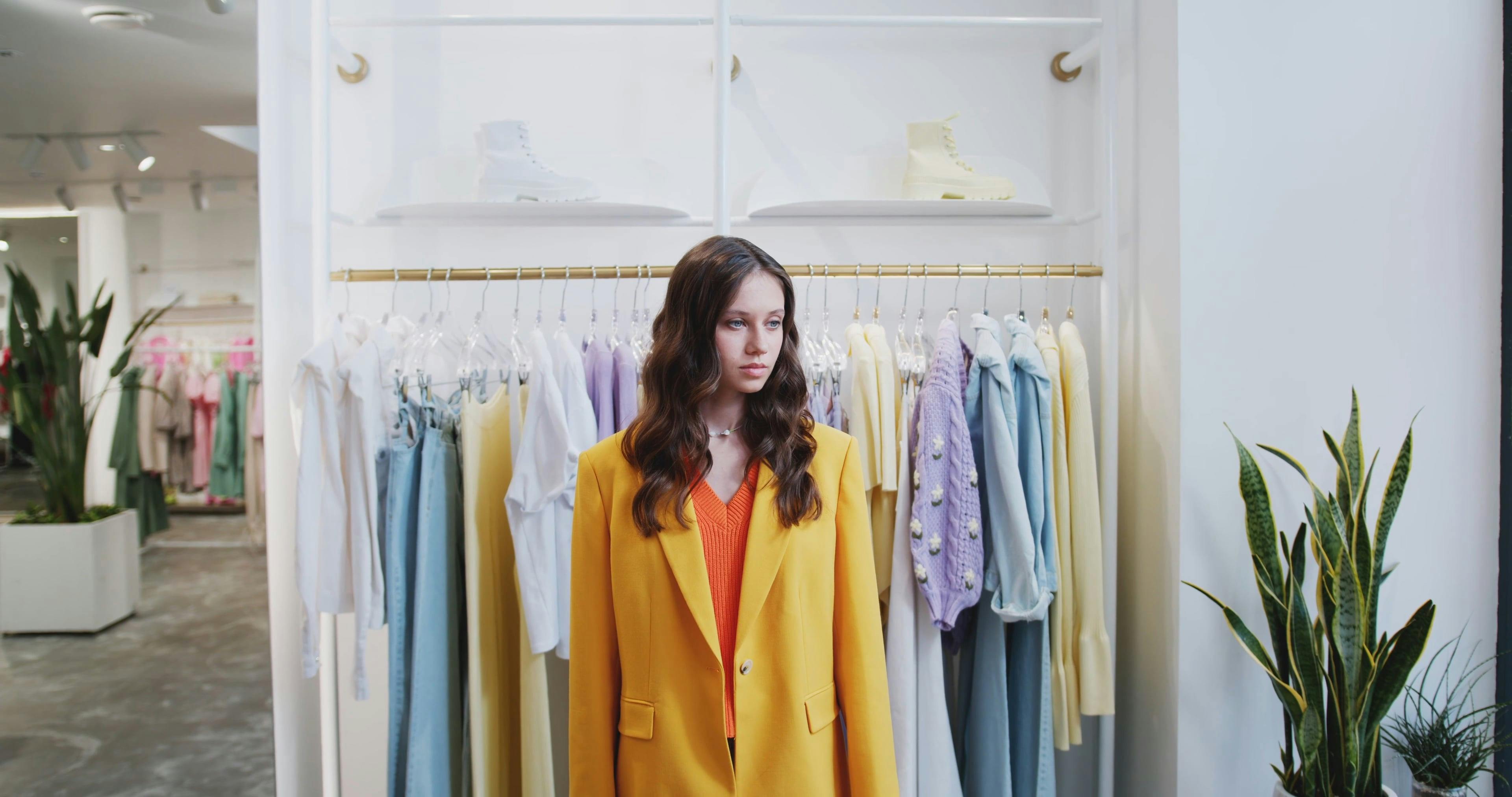 Woman Picking Out Clothes · Free Stock Video