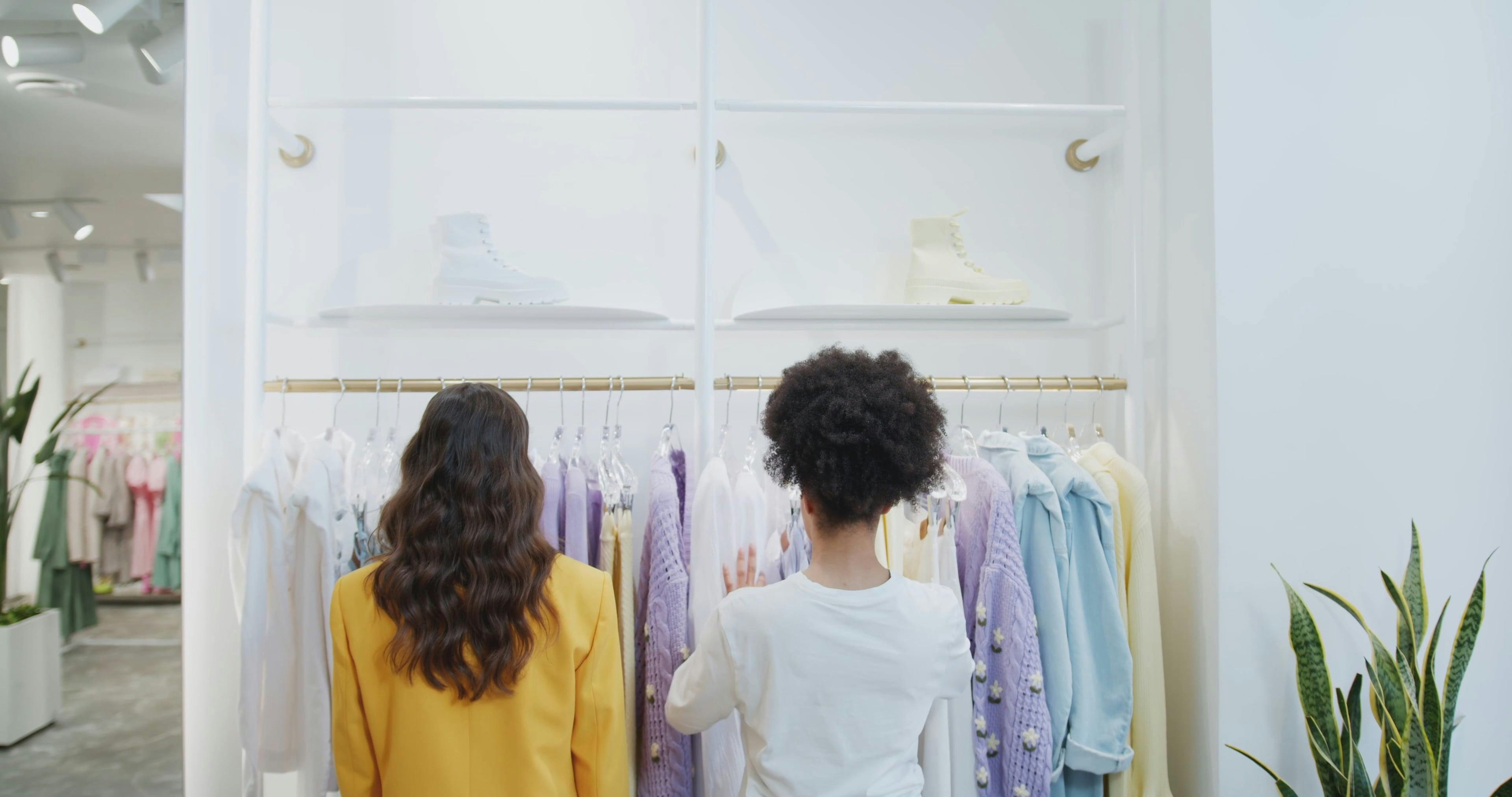 Women Picking Clothes · Free Stock Video