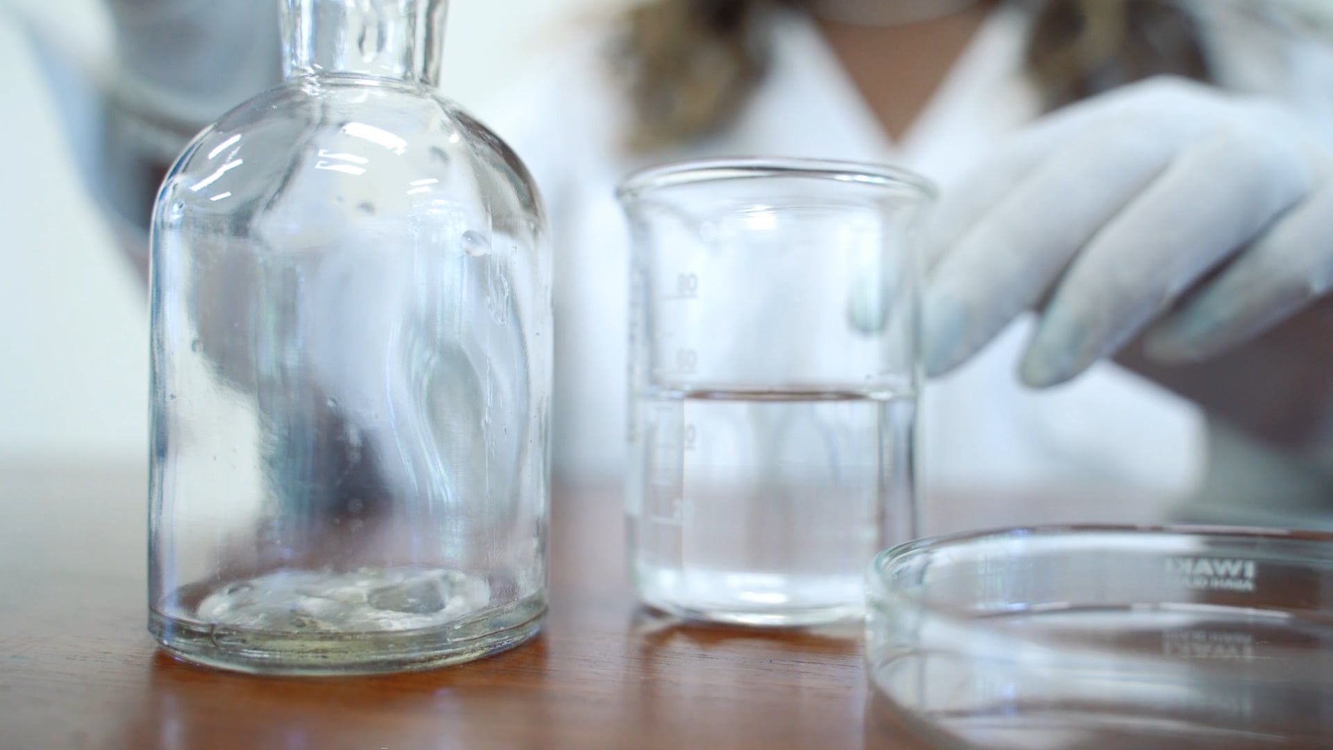 A Person Dropping Liquid on a Glass Bottle Free Stock Video Footage ...
