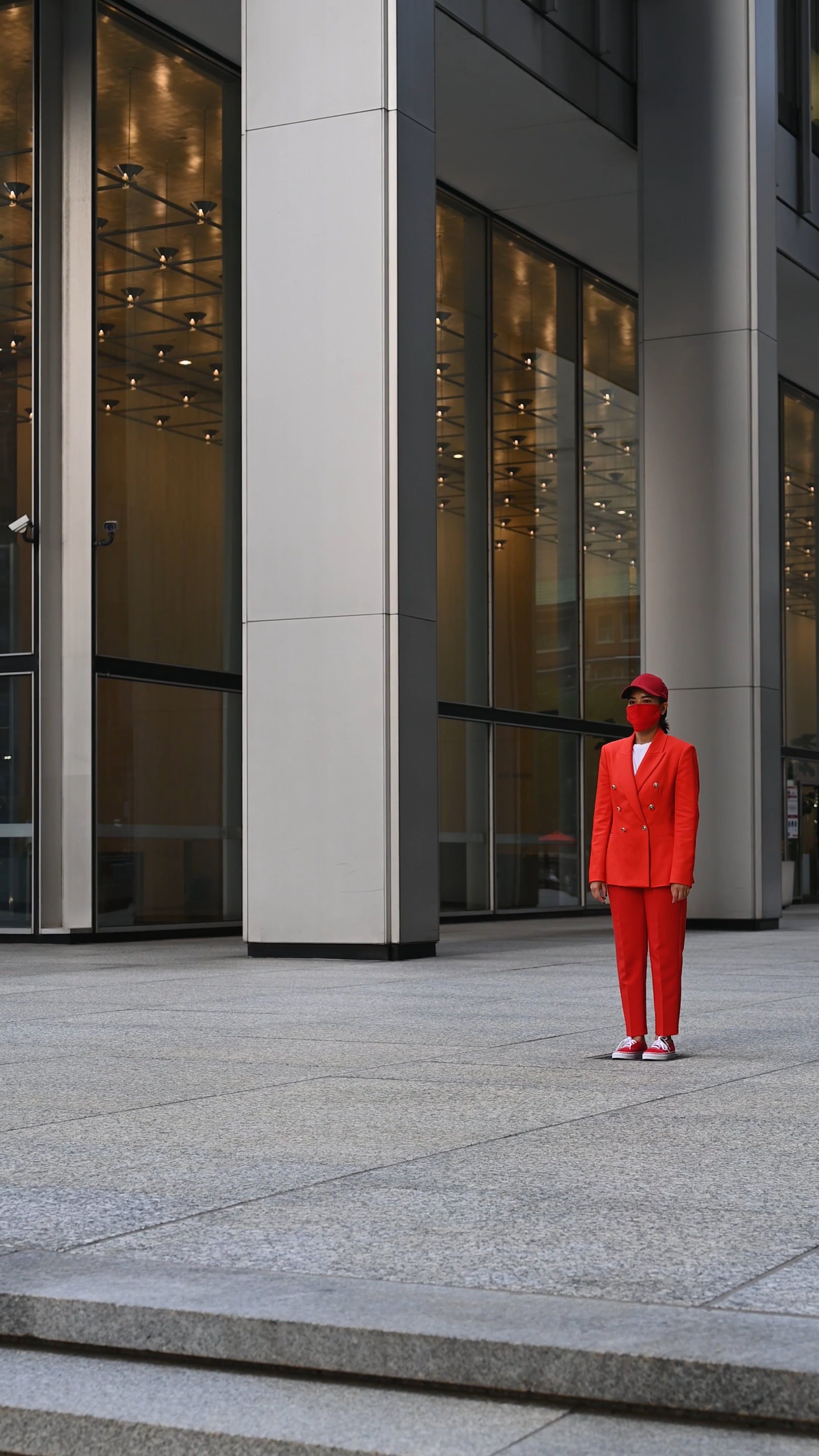 Person Standing Outside a Building · Free Stock Video