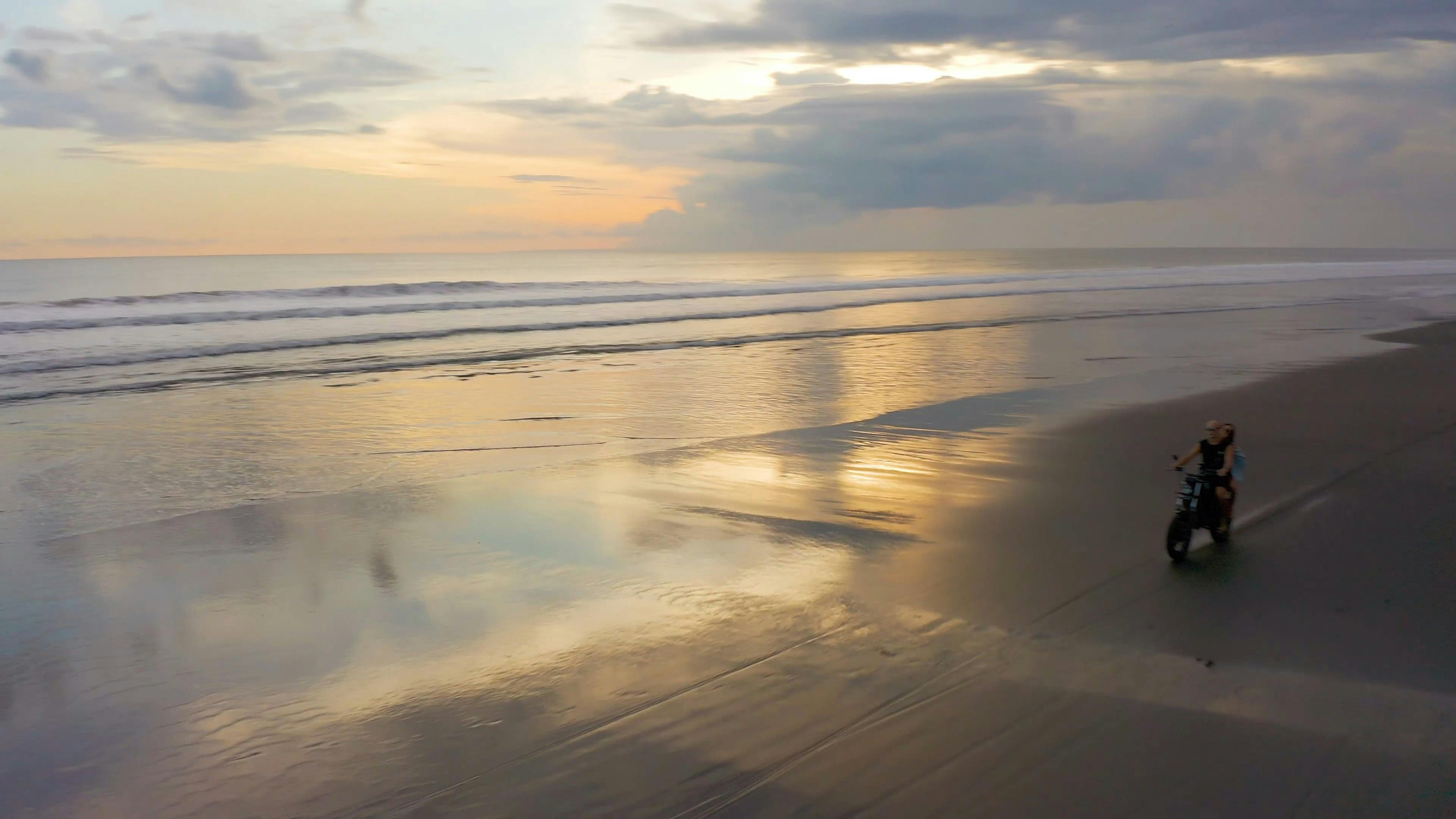 A Man and a Woman Riding a Motorcycle by the Seaside Free Stock Video ...