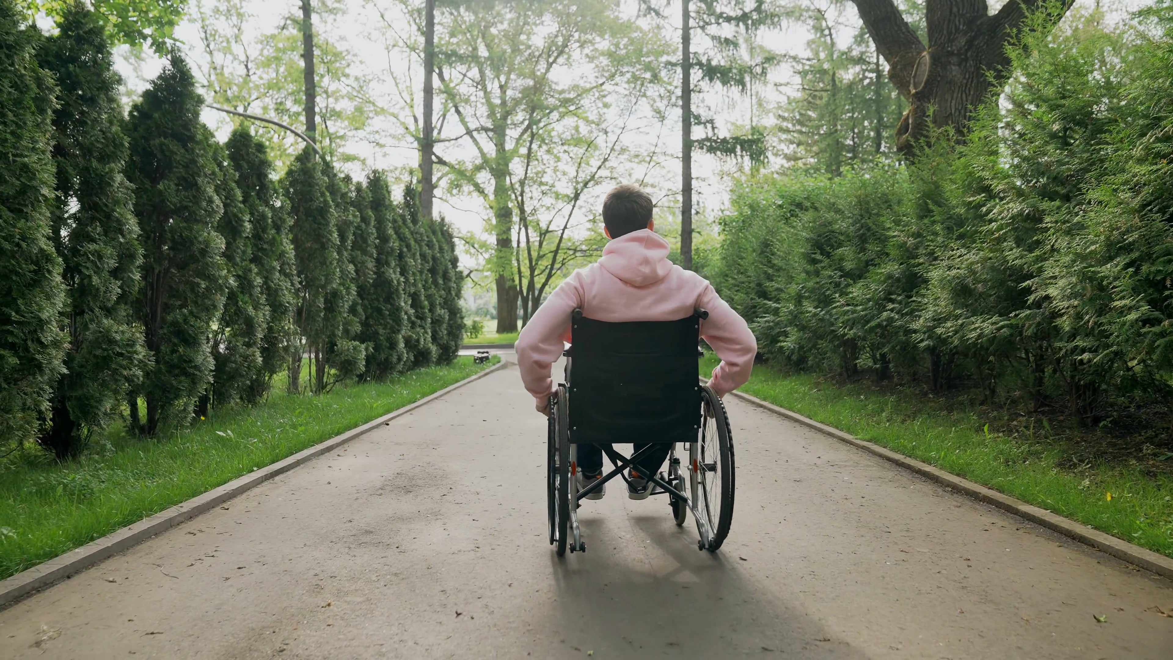 A Man Riding a Wheelchair · Free Stock Video