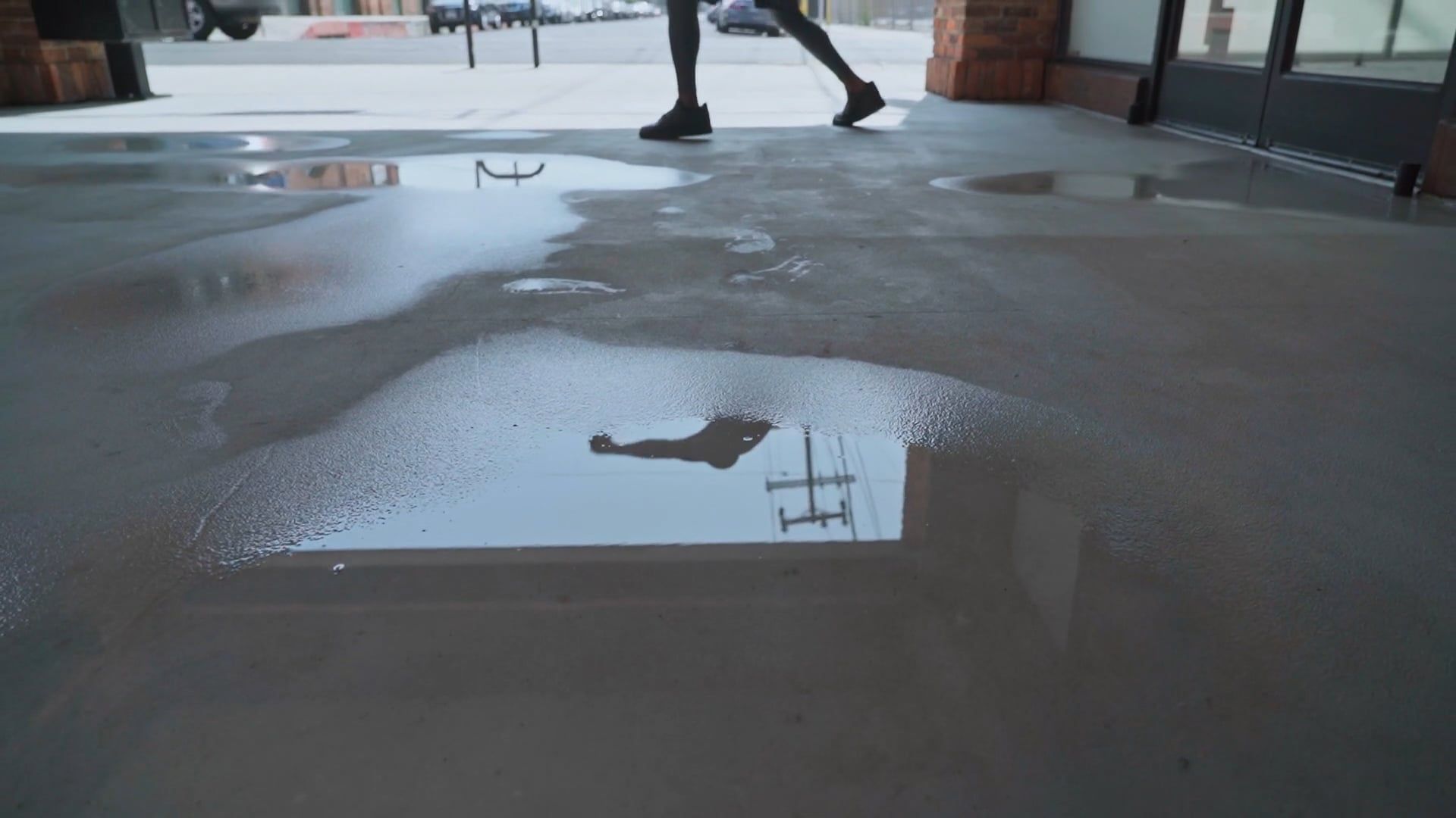 A Man Shadow Boxing Outside a Building · Free Stock Video
