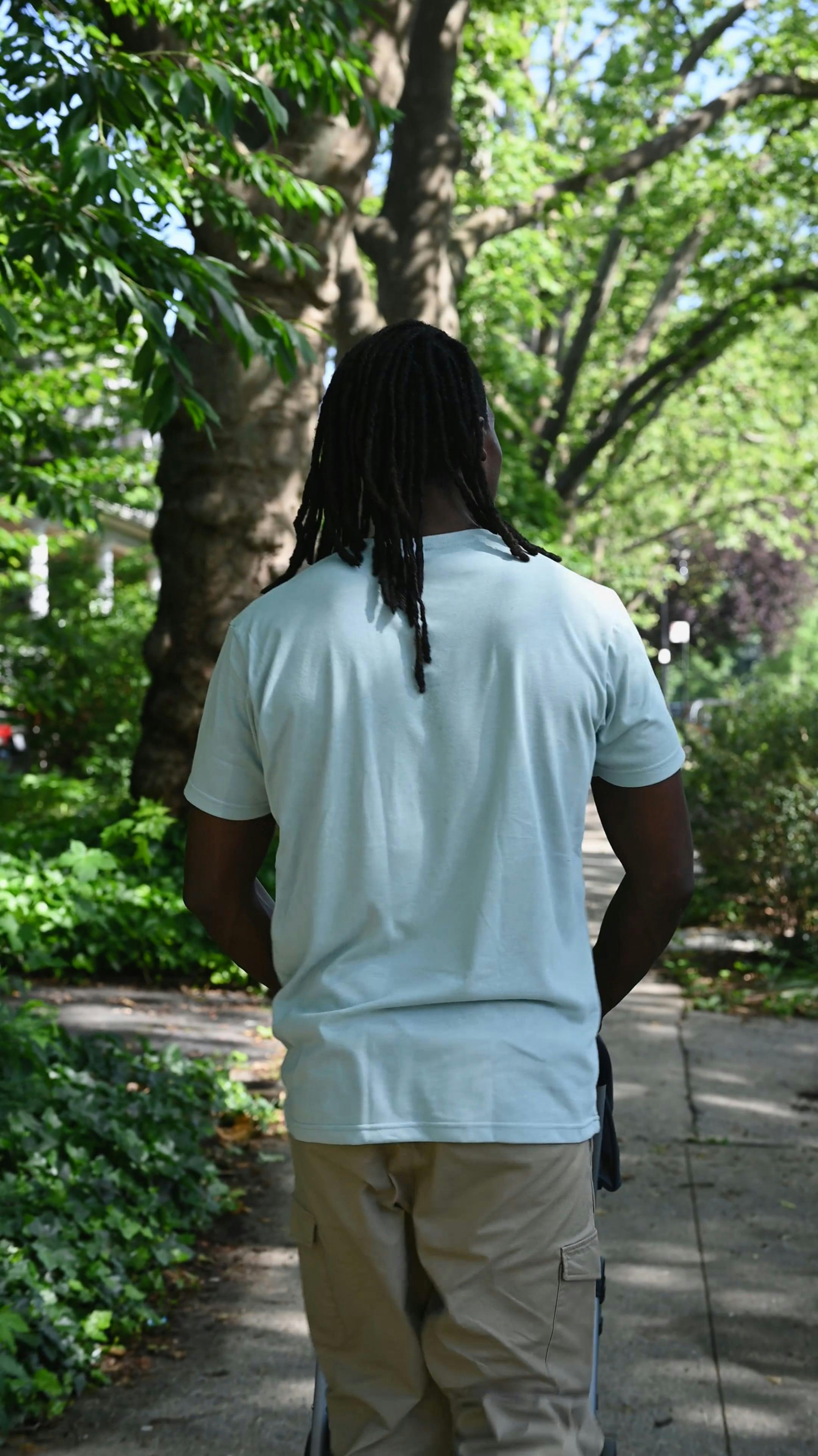 A Man Pushing a Stroller · Free Stock Video