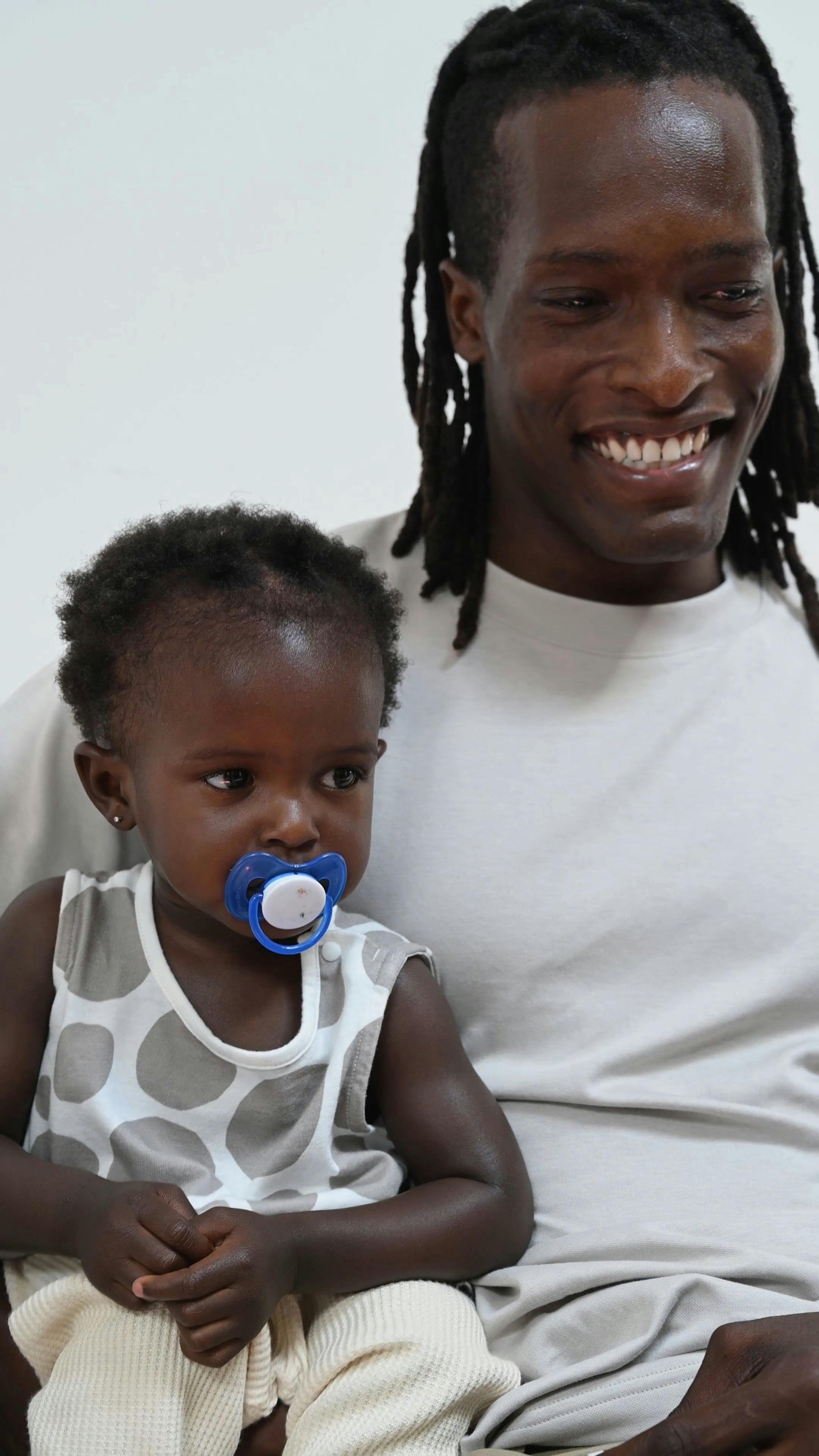 Man Strapping His Baby in a Car Seat Free Stock Video Footage, Royalty ...