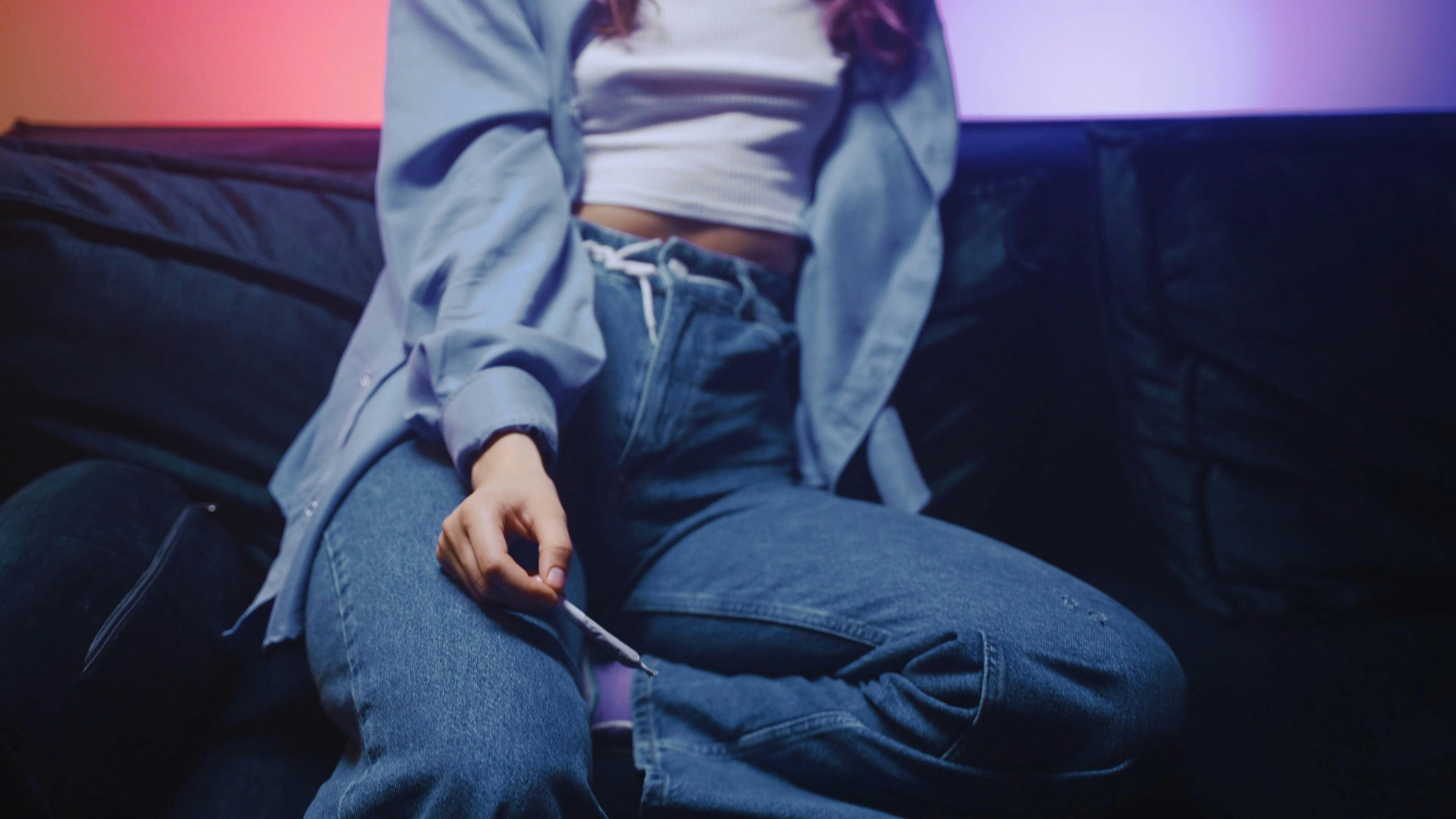A Woman Smelling a Stick Of Marijuana Free Stock Video Footage, Royalty ...