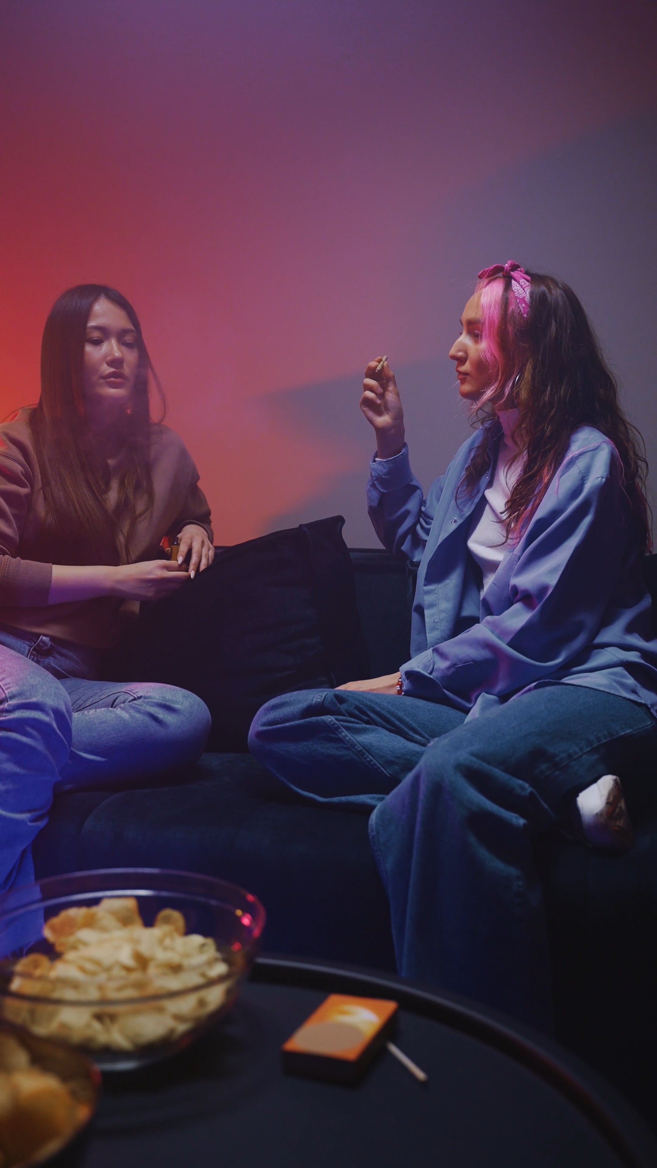 Women Smoking while Sitting on the Couch · Free Stock Video