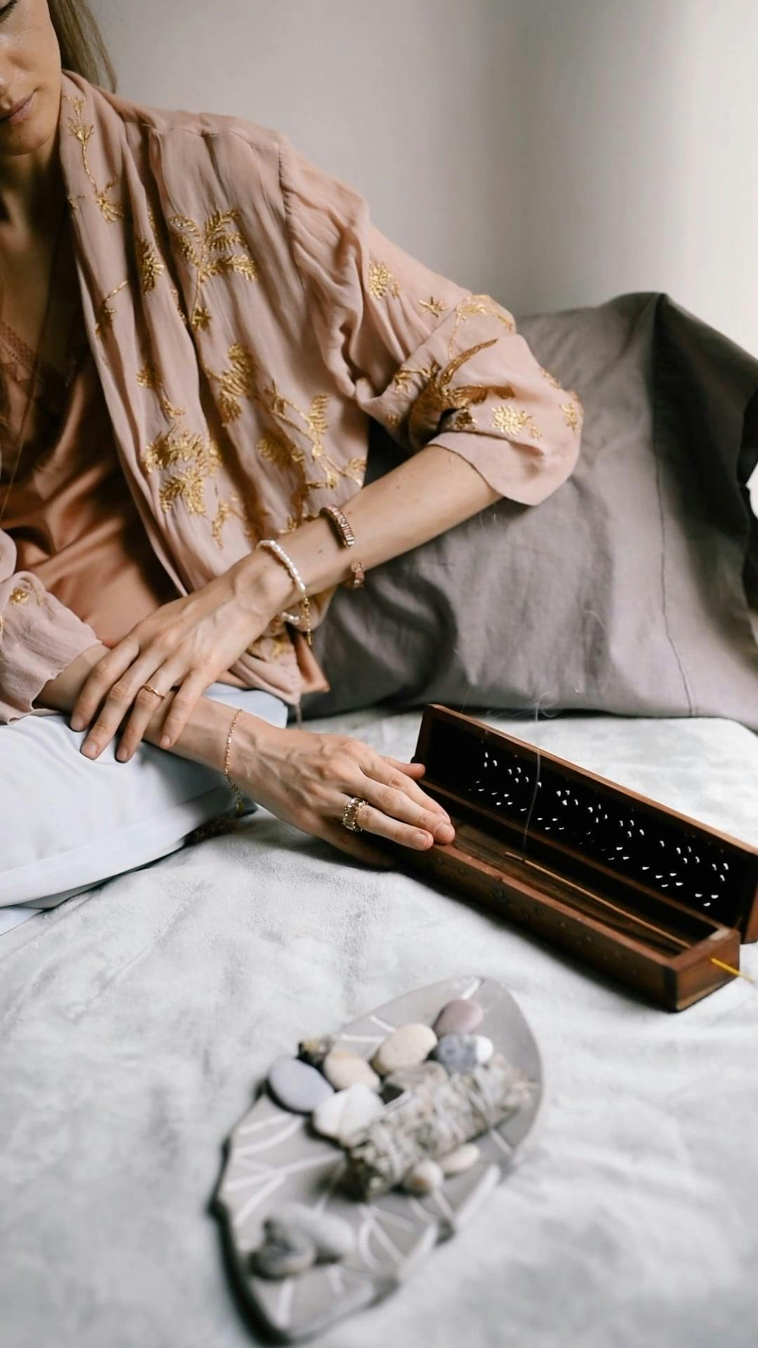 A Woman Getting Aroma Therapy from a Burning Incense · Free Stock Video