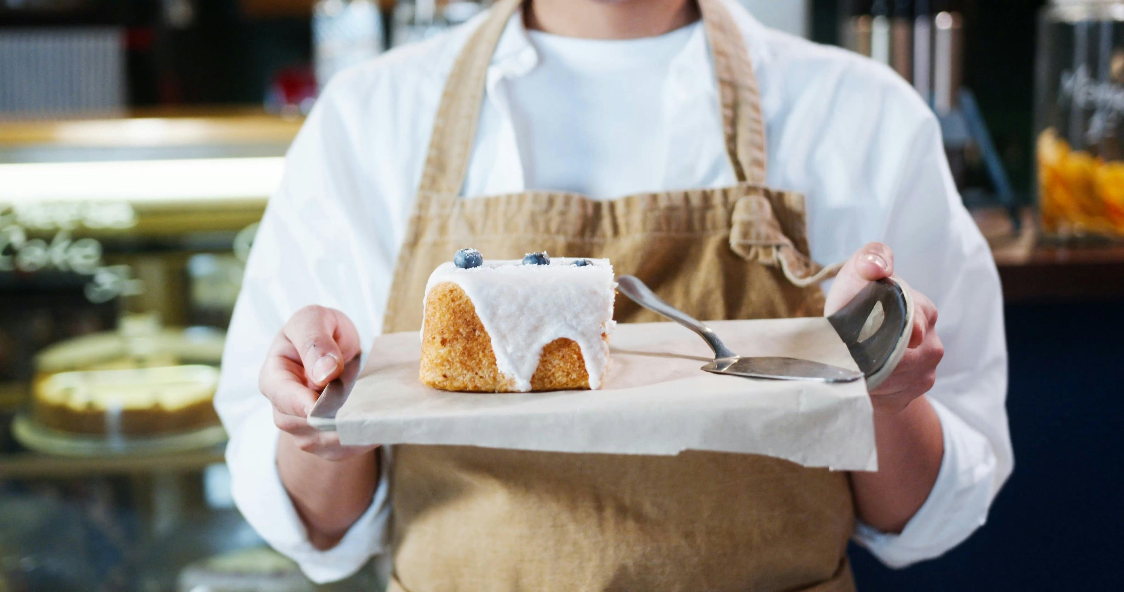 A Woman Holding A Cake · Free Stock Video