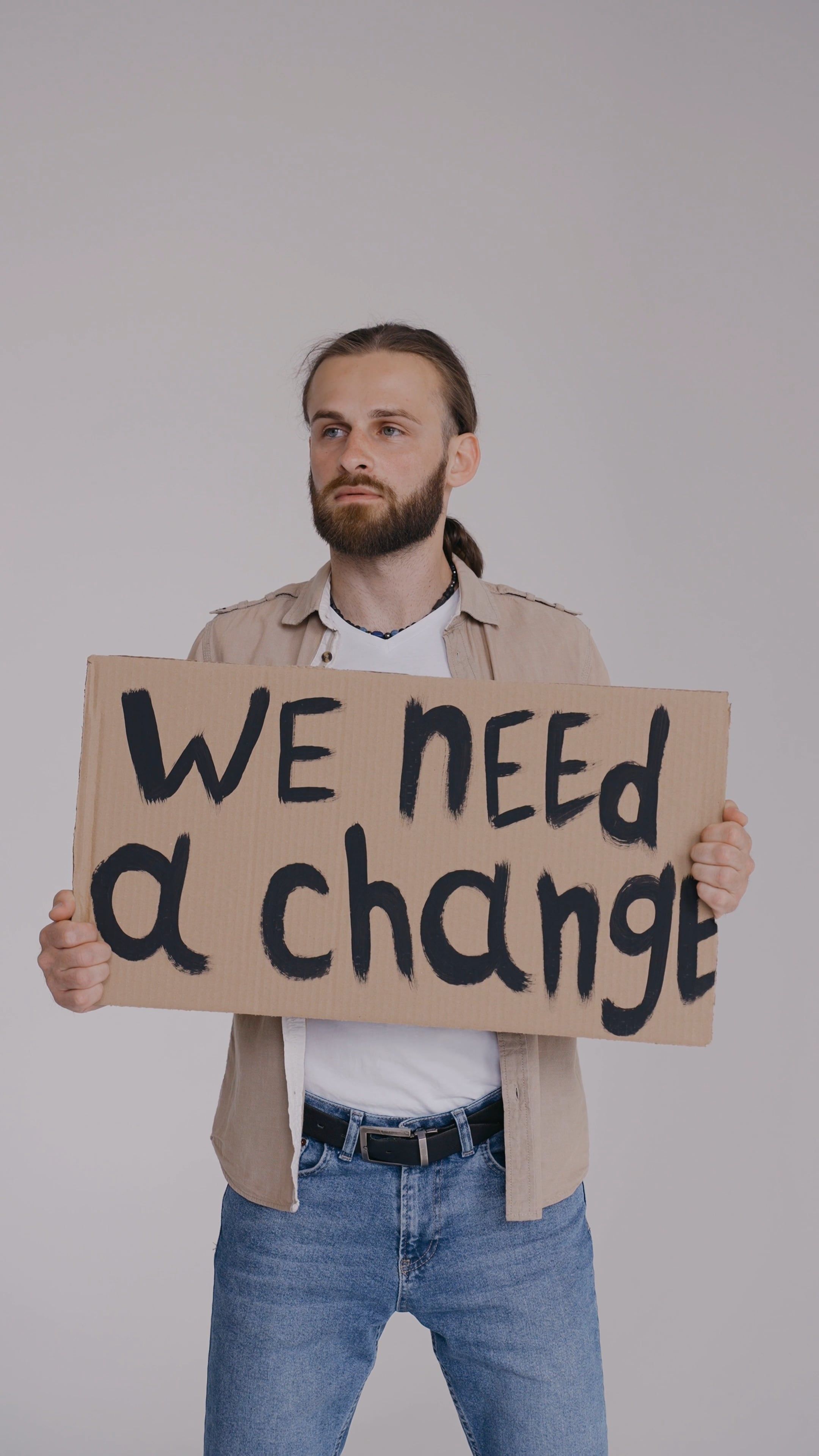 Man Holding a Placard · Free Stock Video