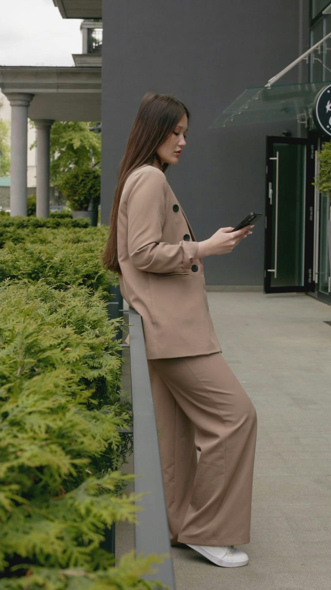 Woman Running Outside The Hall Of A Building · Free Stock Video