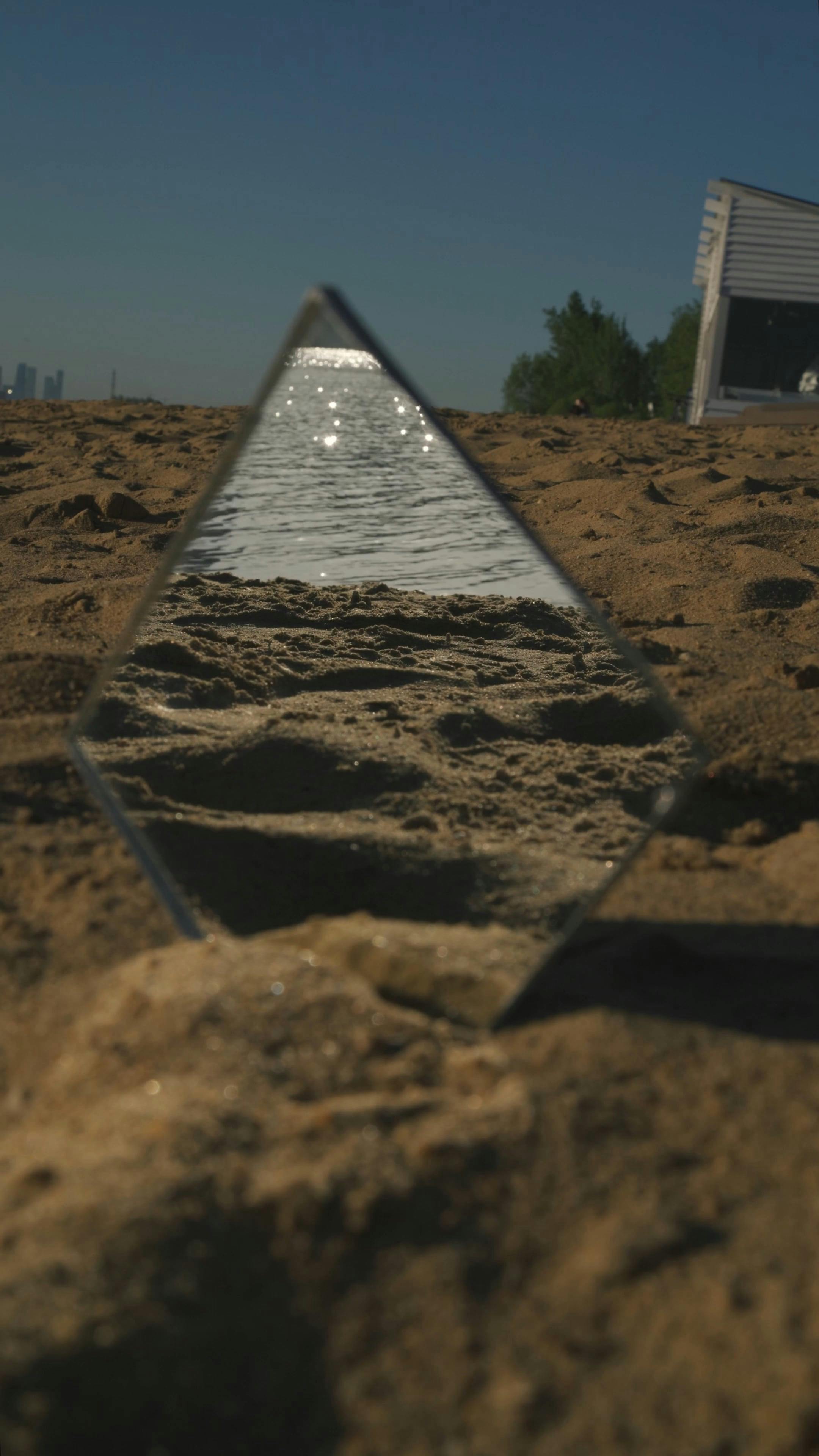 A Mirror on the Sand with Beach Reflection Free Stock Video Footage ...