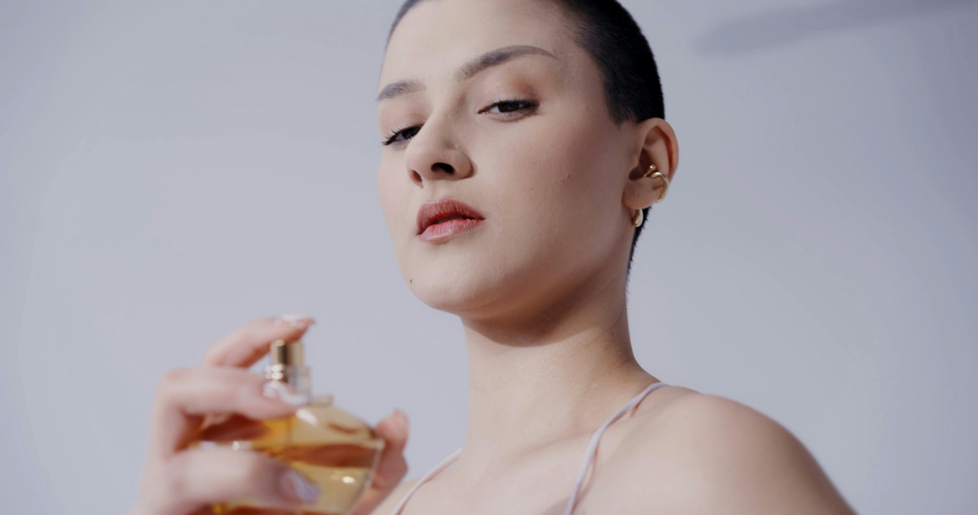 A Close up of a Woman Spraying Perfume Free Stock Video Footage ...