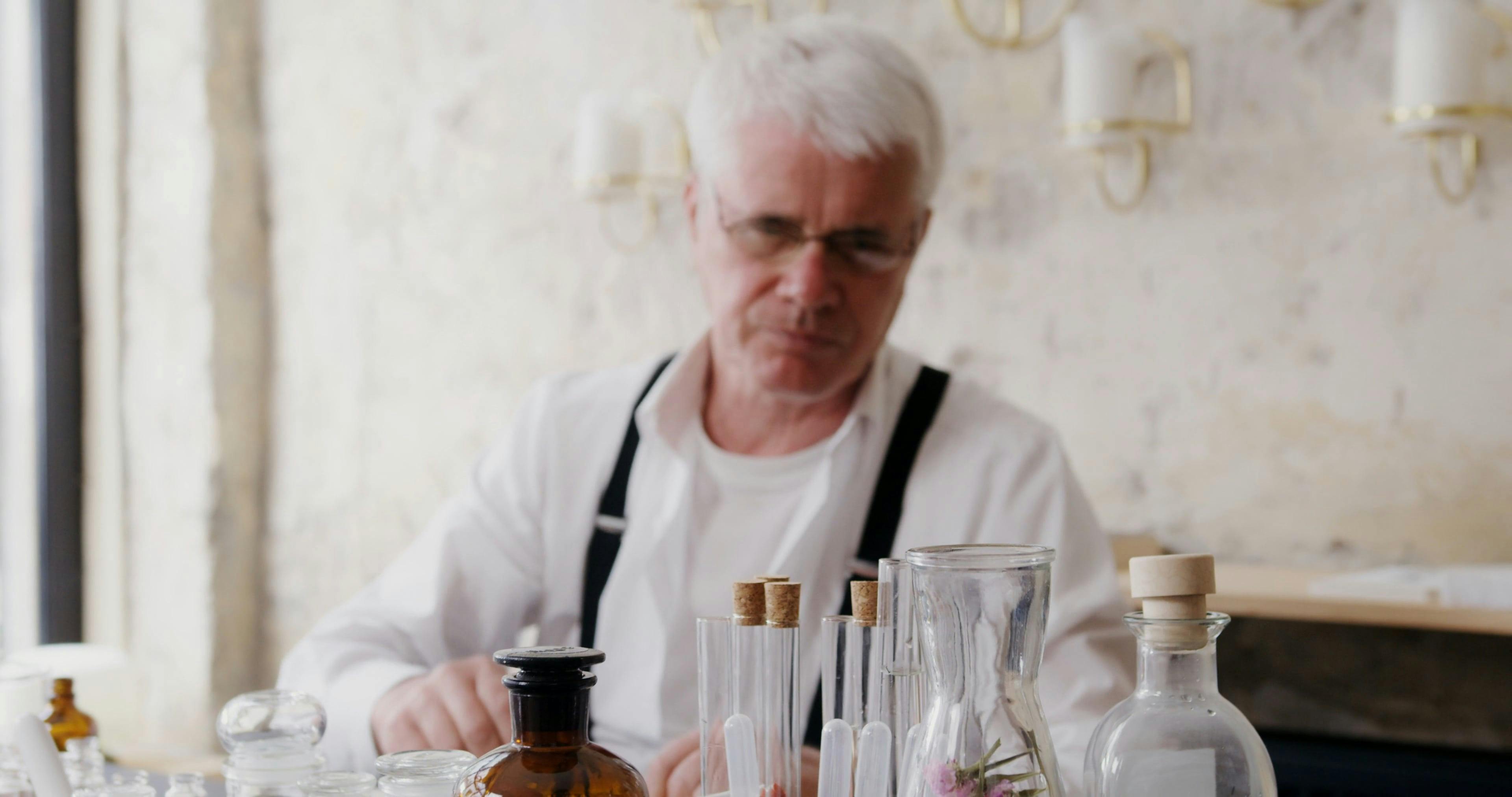 An Elderly Man Smelling a Test Tube Free Stock Video Footage, Royalty ...