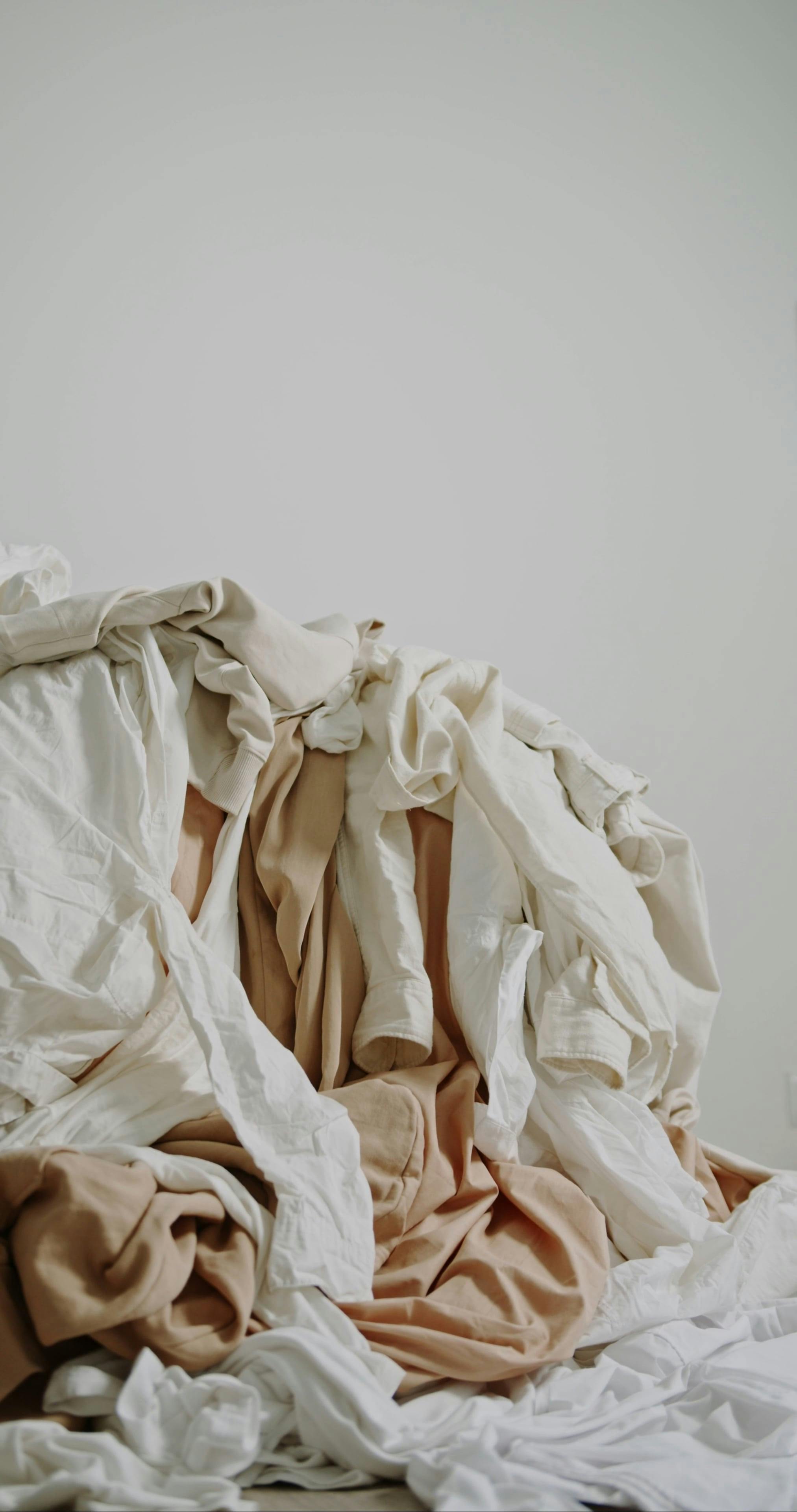 A Pile of Crumpled Clothes on the Floor · Free Stock Video