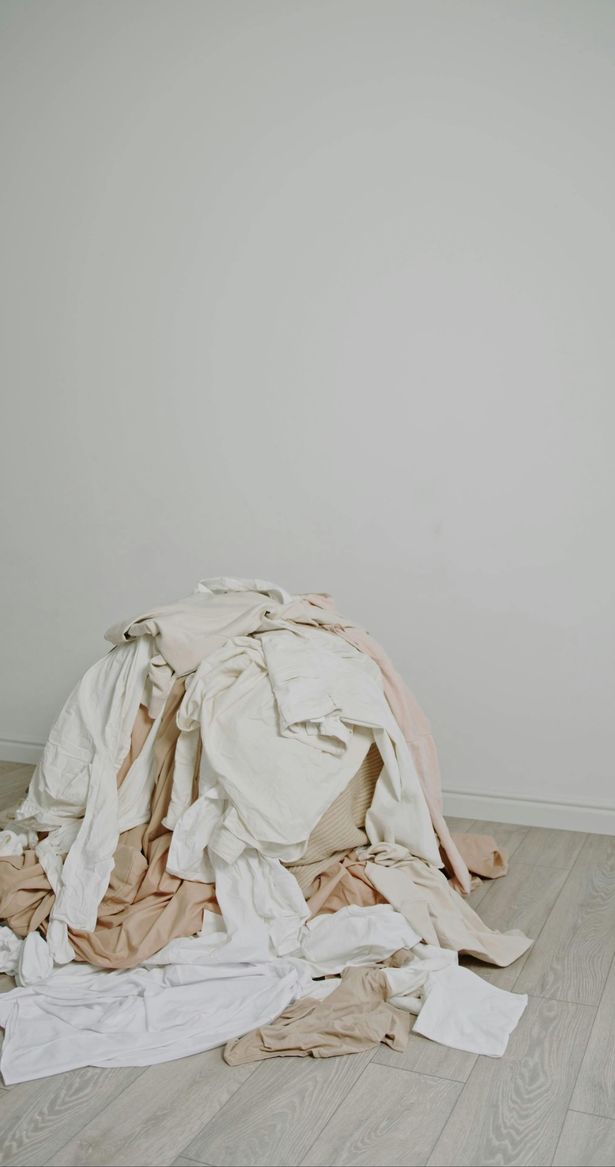 A Pile of Crumpled Clothes on the Floor · Free Stock Video