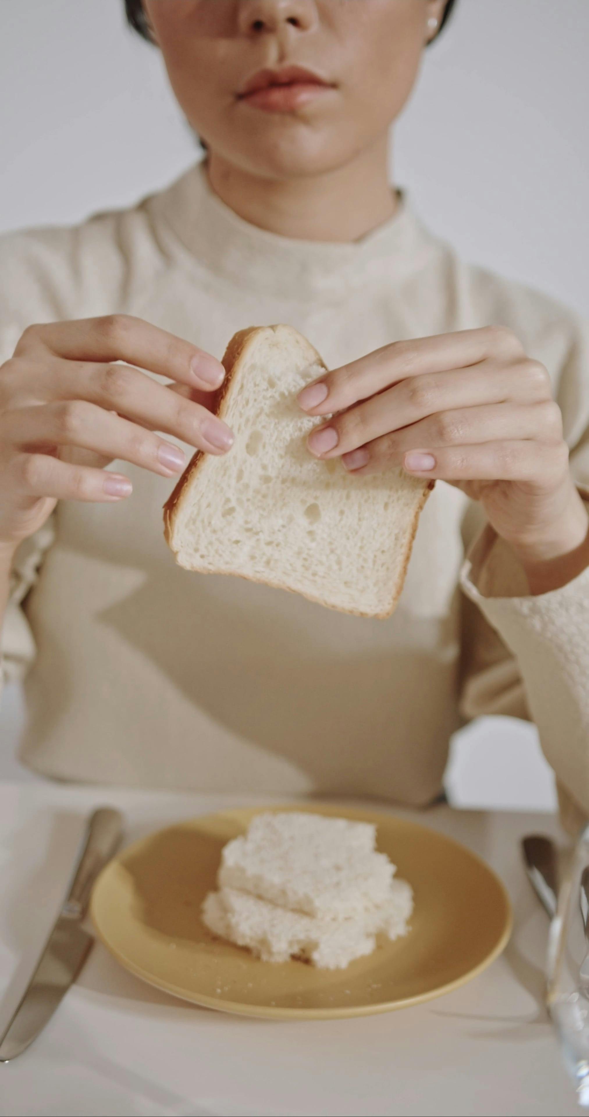 Woman Removing ad Throwing the Crust of a Bread Free Stock Video ...