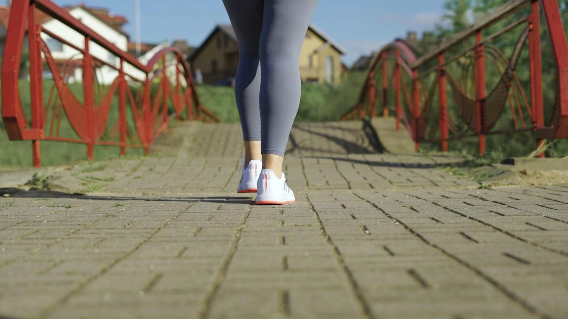 A Woman Crossing a Bridge Free Stock Video Footage, Royalty-Free 4K ...