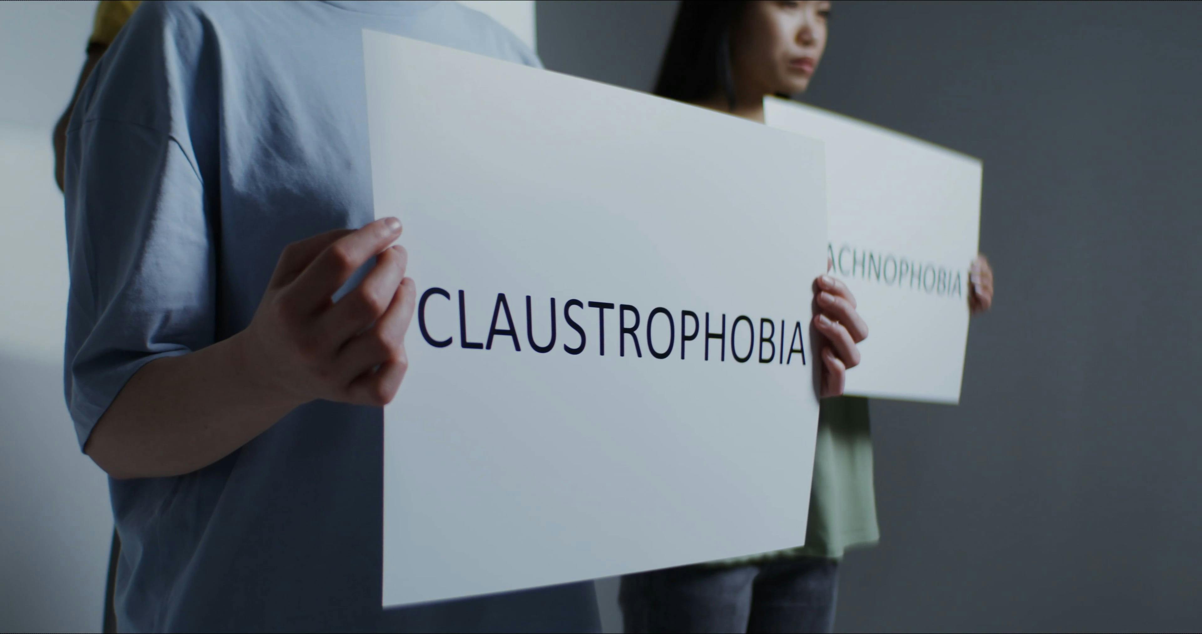 People Holding Signs Of Different Phobias · Free Stock Video