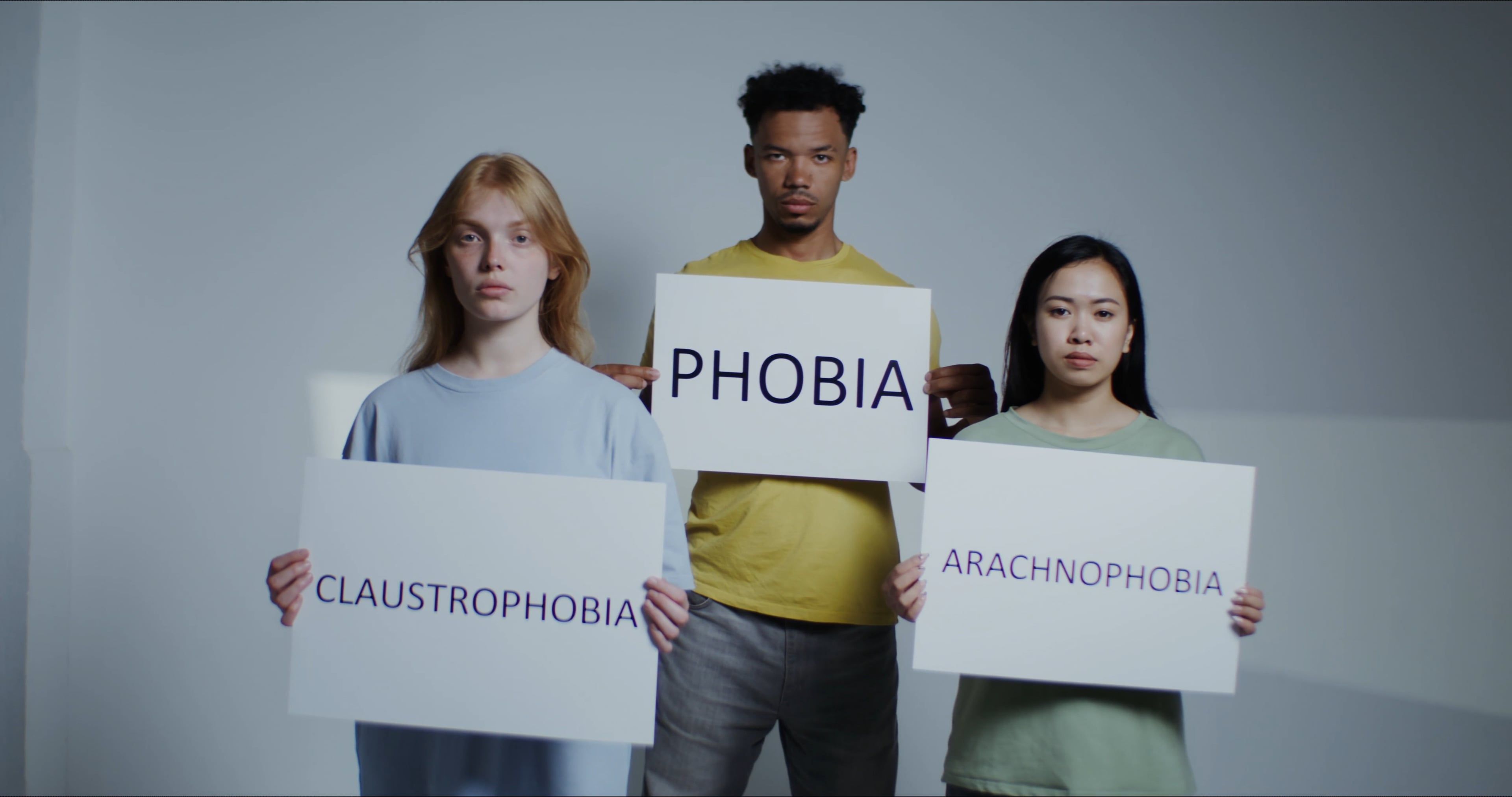 People Holding Signs Of Different Phobia · Free Stock Video