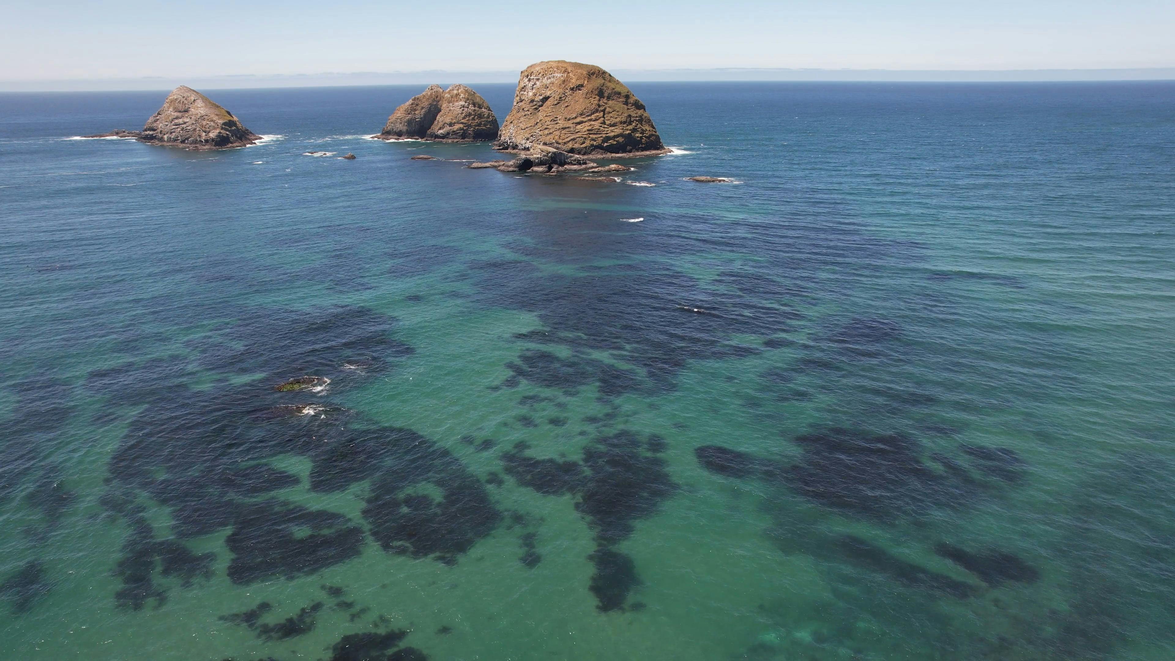 Aerial Footage of a Sea Stack Free Stock Video Footage, Royalty-Free 4K ...