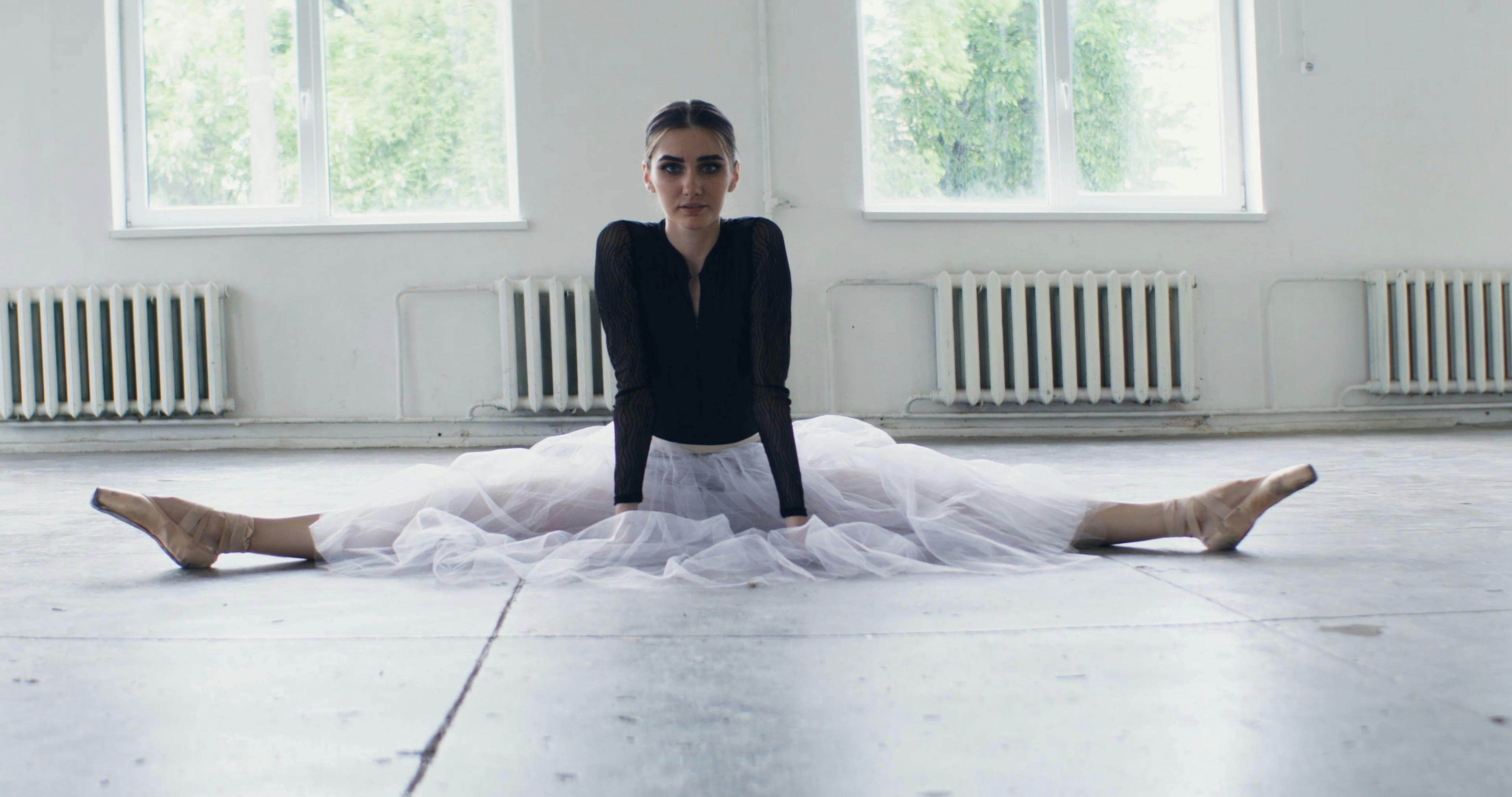 A Ballerina Doing a Leg Split on the Floor · Free Stock Video