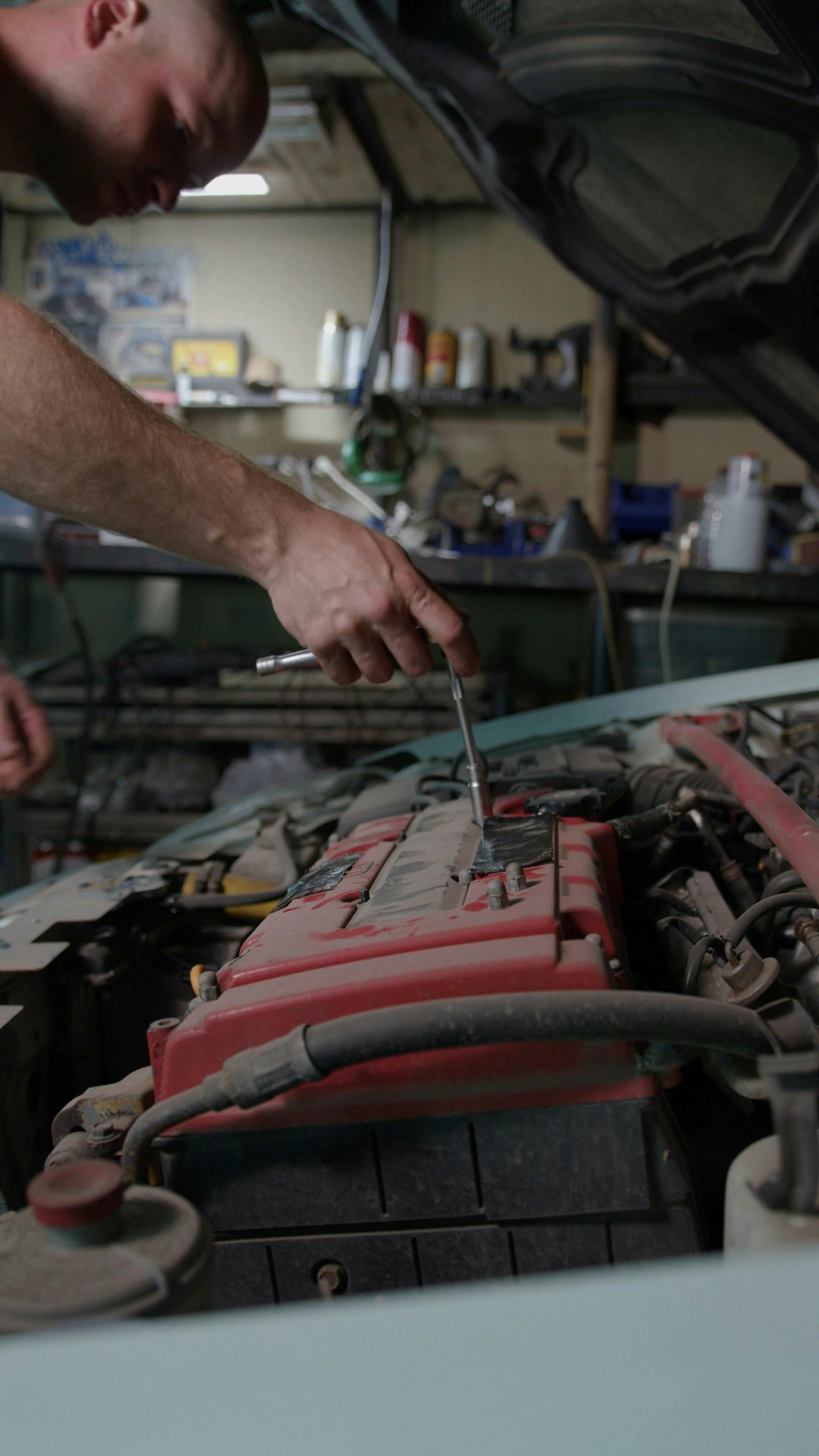 A Man Repairing a Broken Car Free Stock Video Footage, Royalty-Free 4K ...