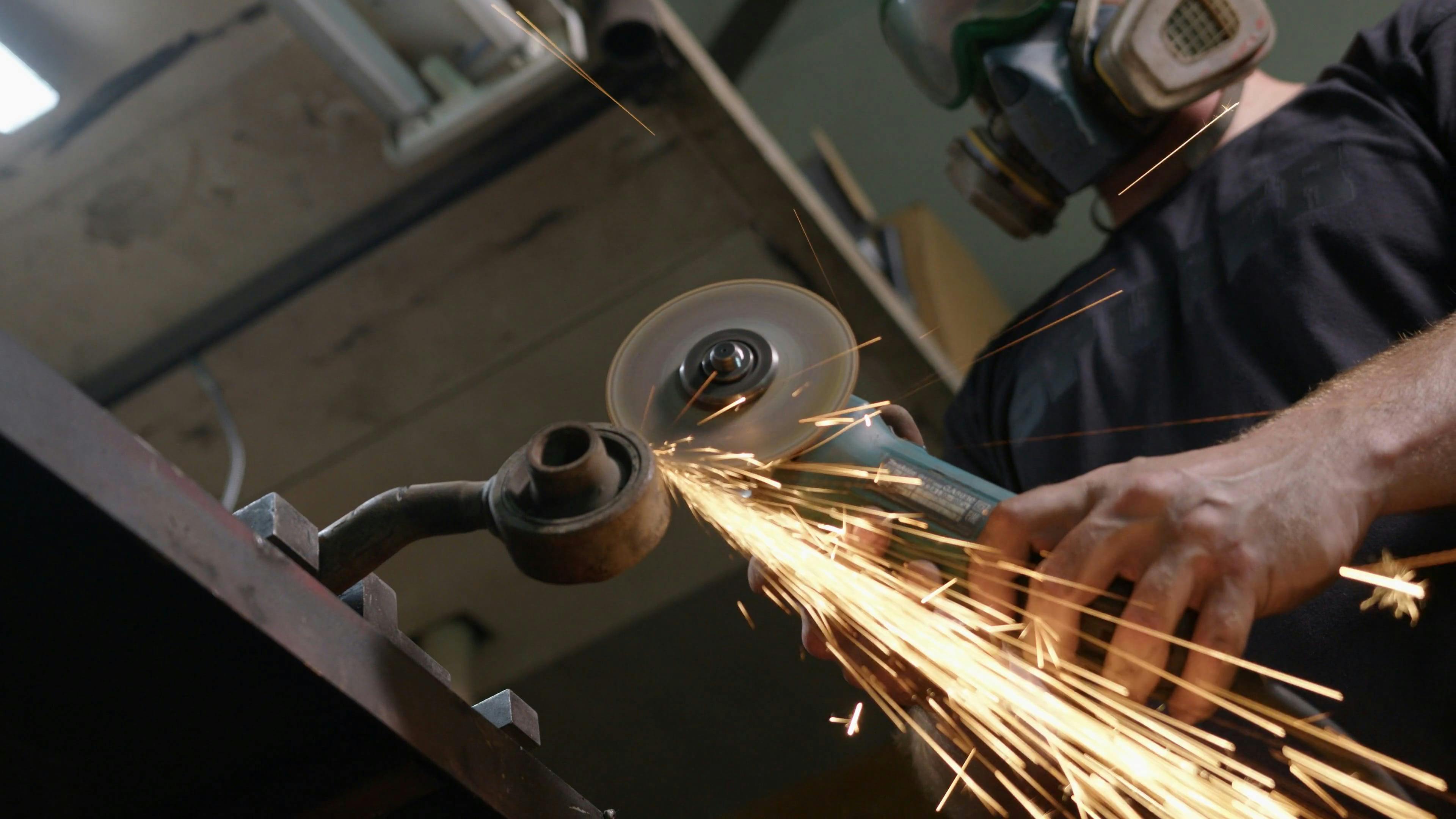 Man using Angle Grinder · Free Stock Video