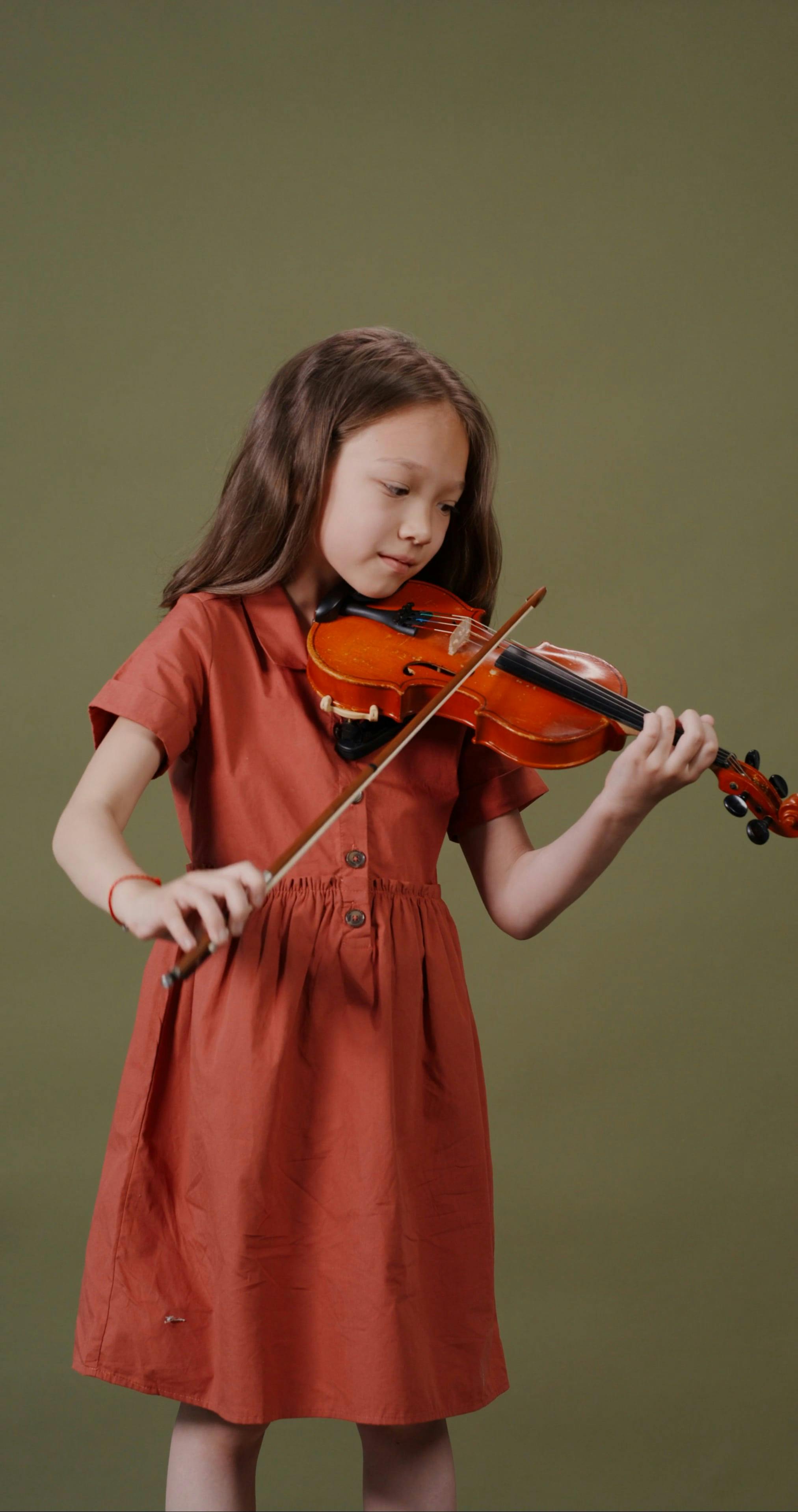 A Girl Standing While Playing Violin Free Stock Video Footage, Royalty ...