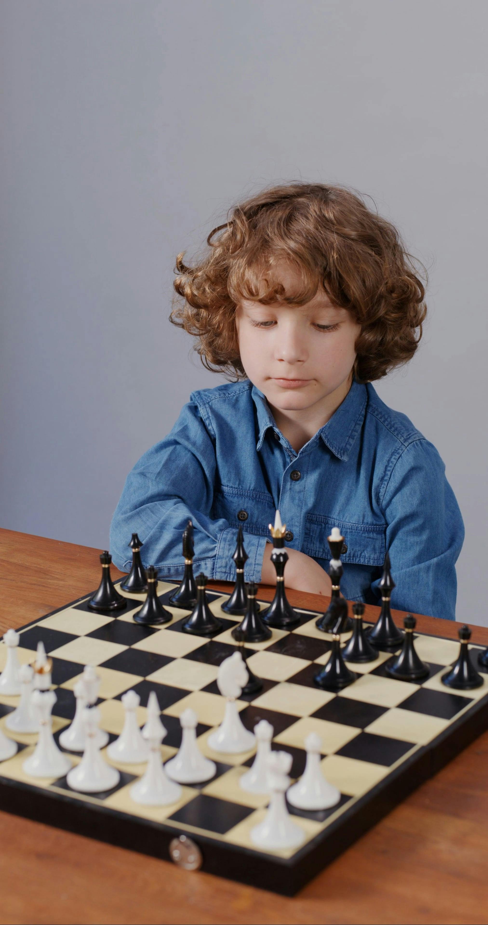 Boy Thinking a Move In Chess · Free Stock Video