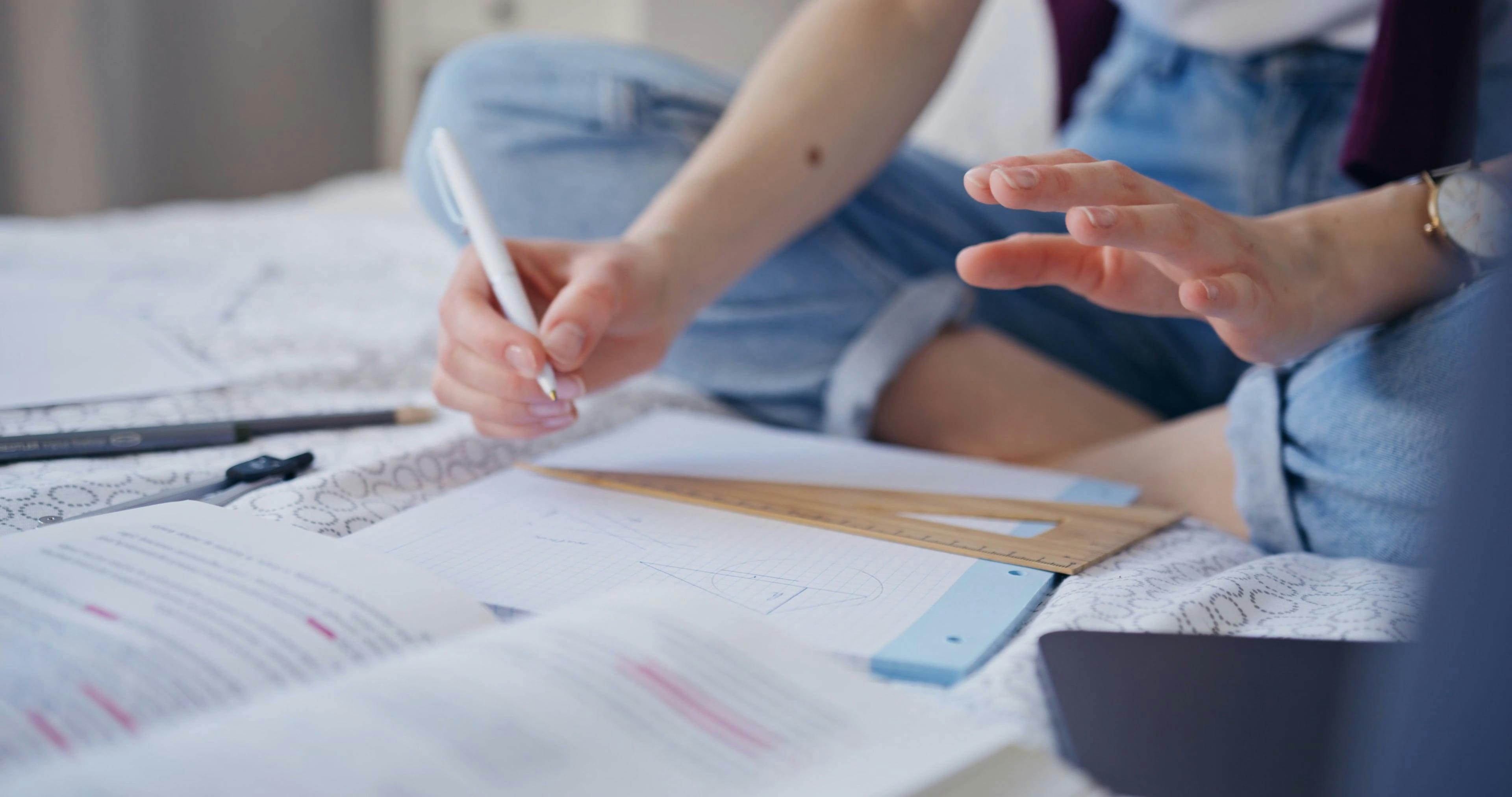 Close up Shot of a Student Doing Homework Free Stock Video Footage ...