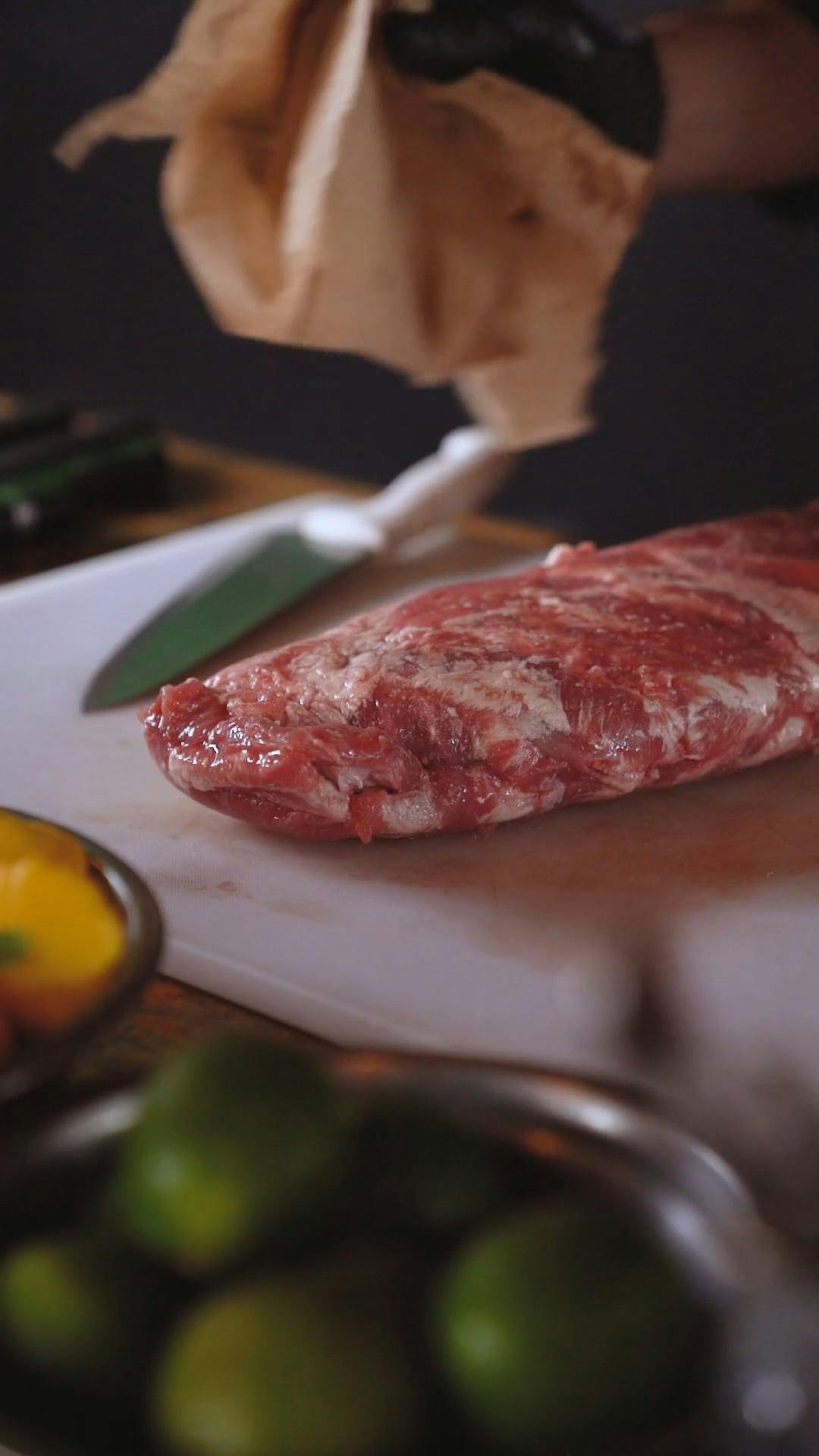 Person Wiping a Meat with a Tissue · Free Stock Video