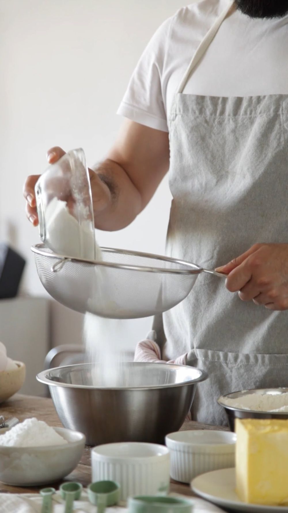 A Person Sifting Flour Free Stock Video A Person Sifting Flour Free Stock Video