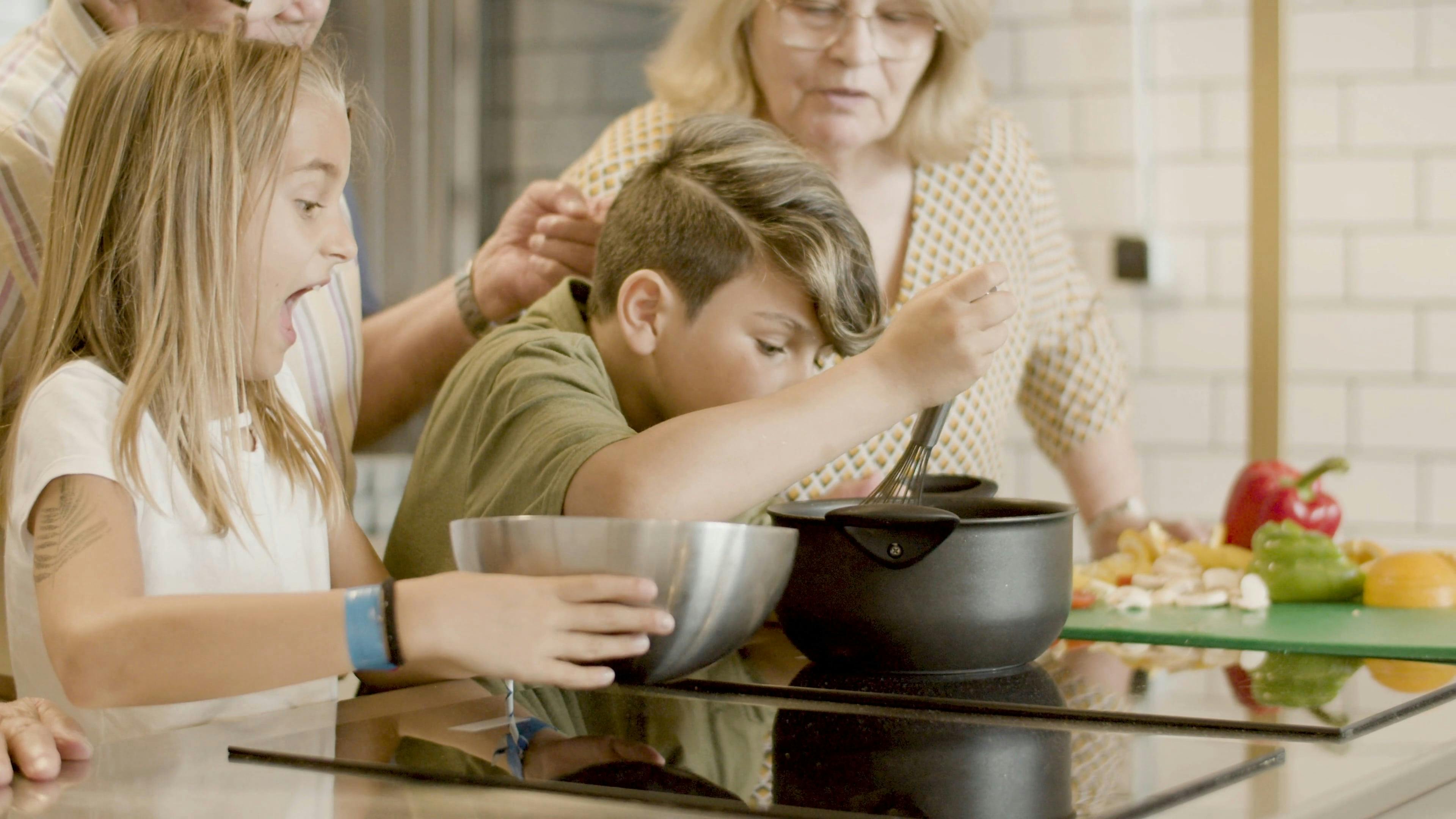 Grandparents Teaching Grandchildren how to Cook Free Stock Video ...
