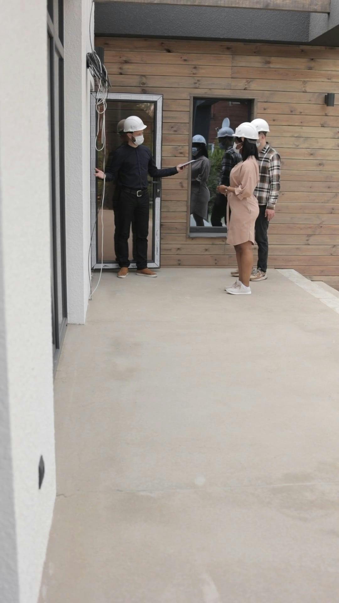 People in a Under Construction House · Free Stock Video