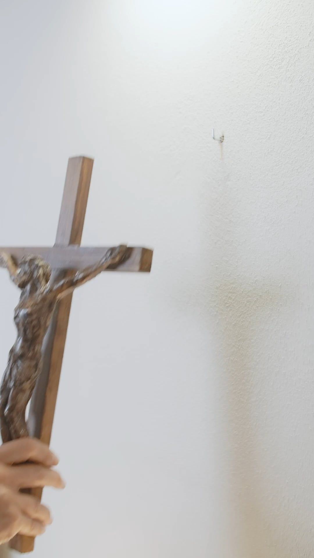 Person Displaying the Crucifix · Free Stock Video