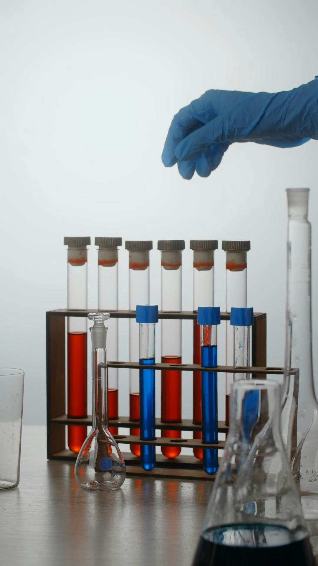 Footage Of Someone Shaking Chemical In The Laboratory Free Stock Video ...