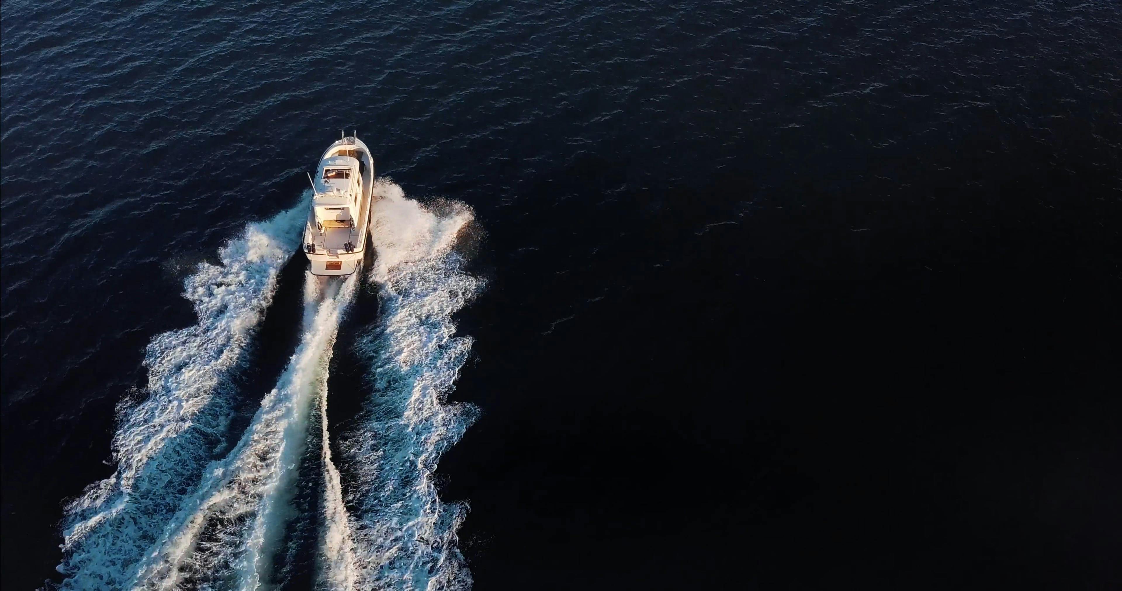 Drone Footage of a Boat Headed for an Island · Free Stock Video