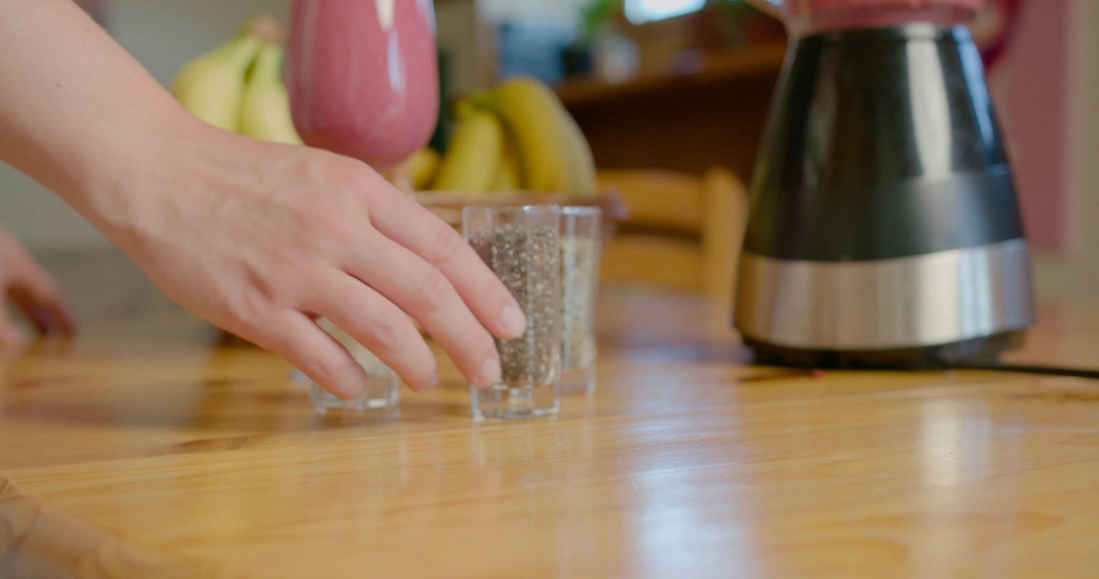 A Person Pouring Chia Seeds in the Smoothie · Free Stock Video