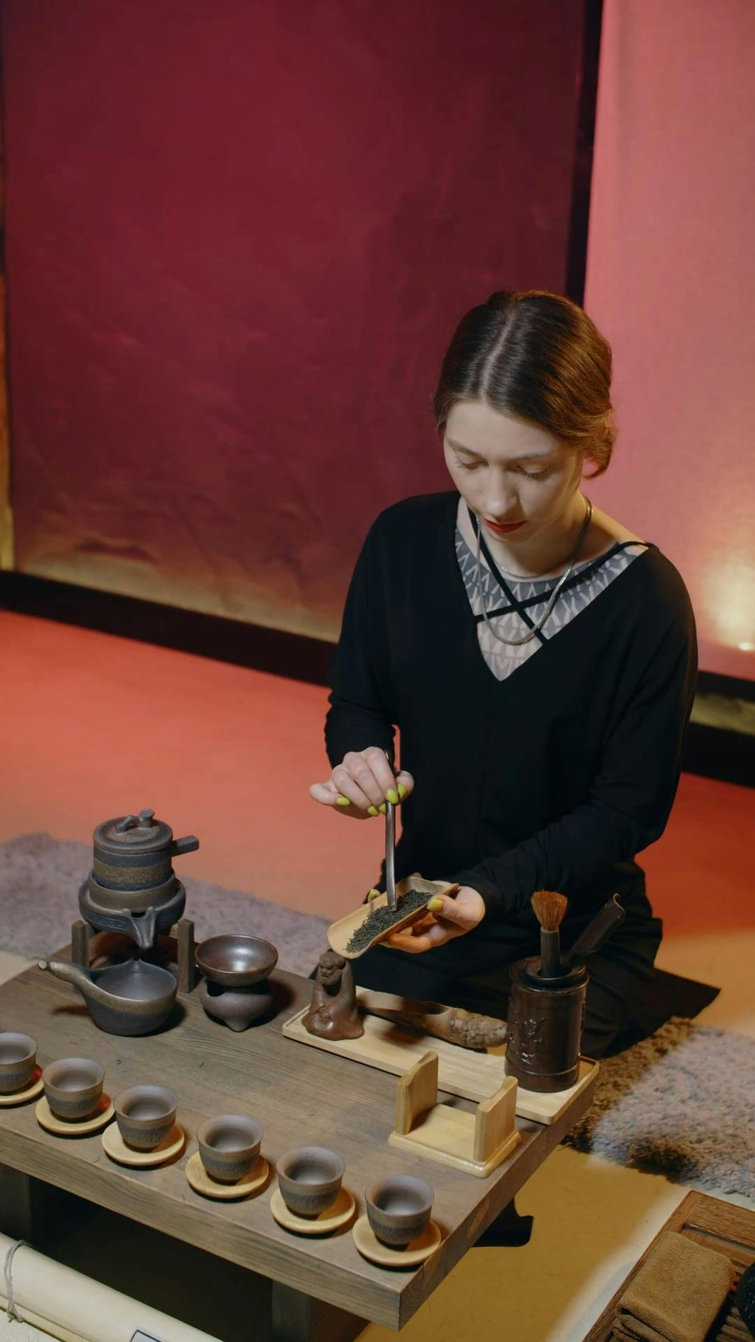 A Woman Preparing Green Tea at a Tea Ceremony · Free Stock Video