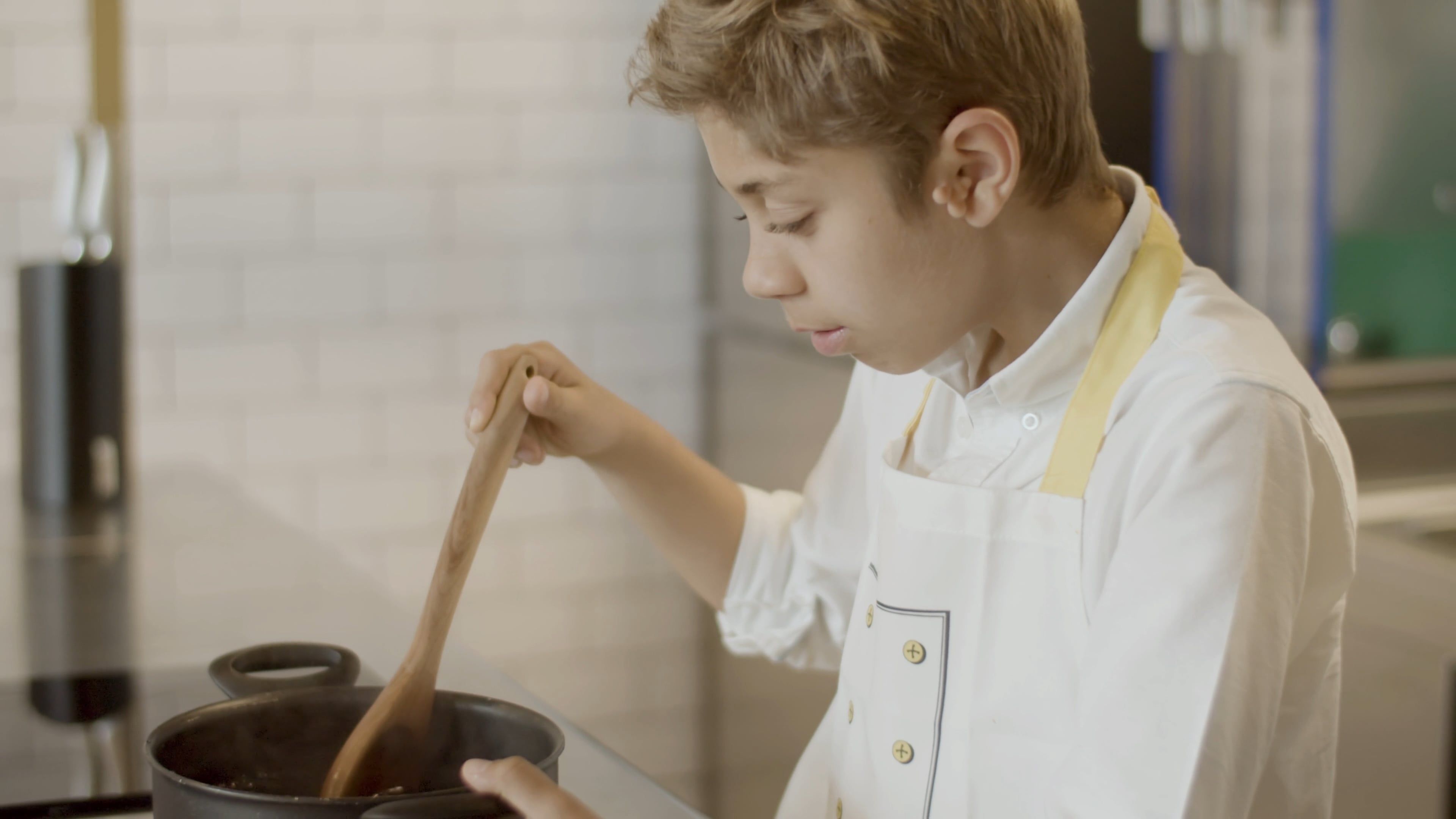 A Boy Cooking at the Kitchen Free Stock Video Footage, Royalty-Free 4K ...