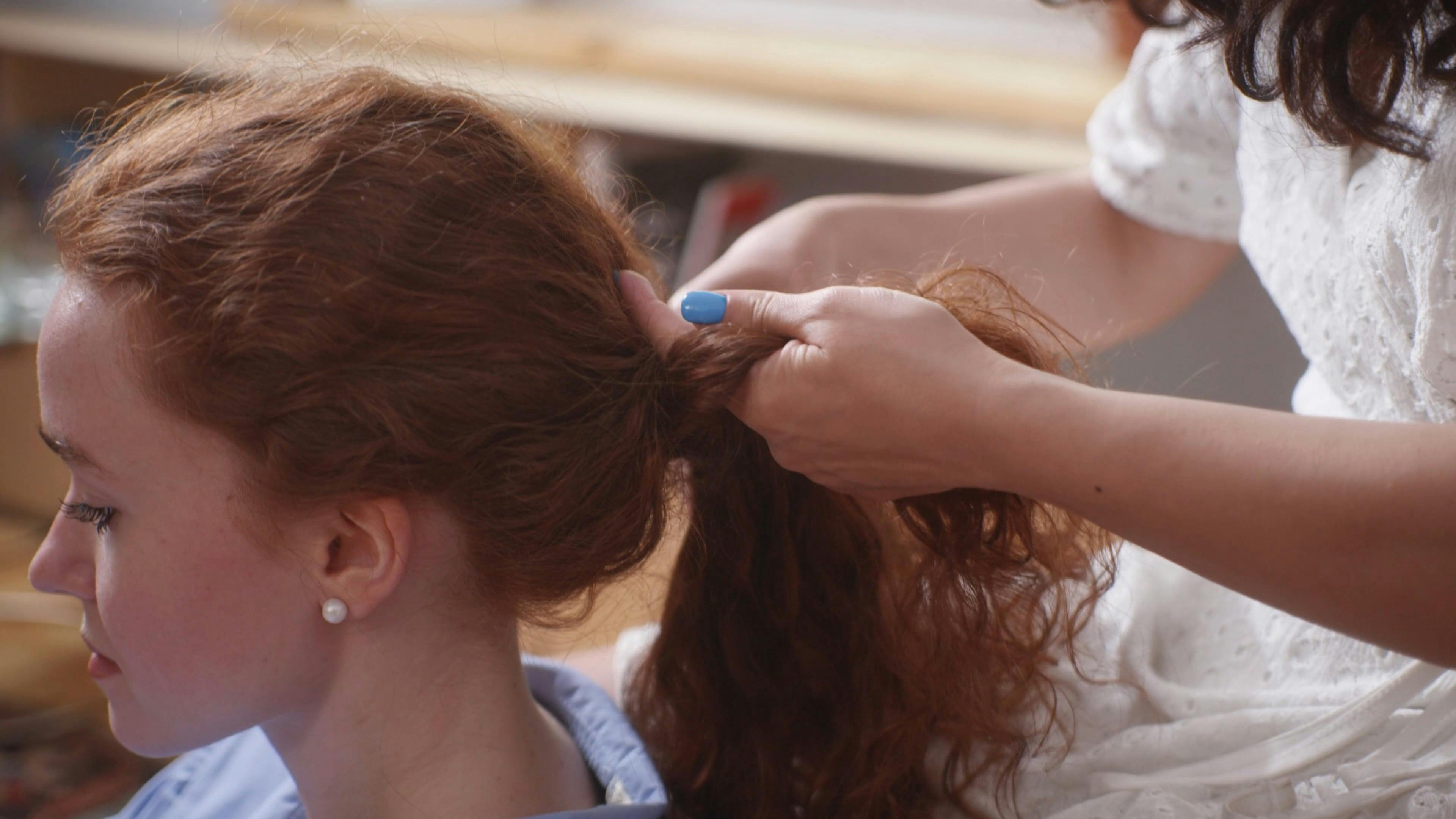 Woman Fixing Hair Free Stock Video Footage, Royalty-Free 4K & HD Video Clip