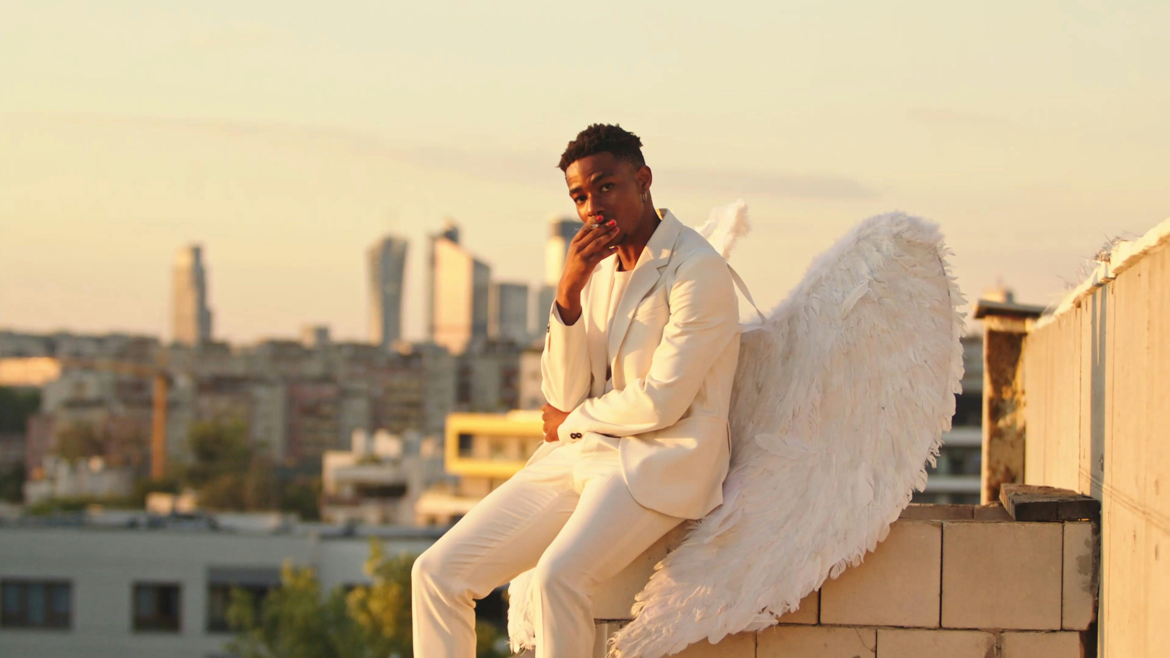 An Angel Smoking a Cigarette · Free Stock Video