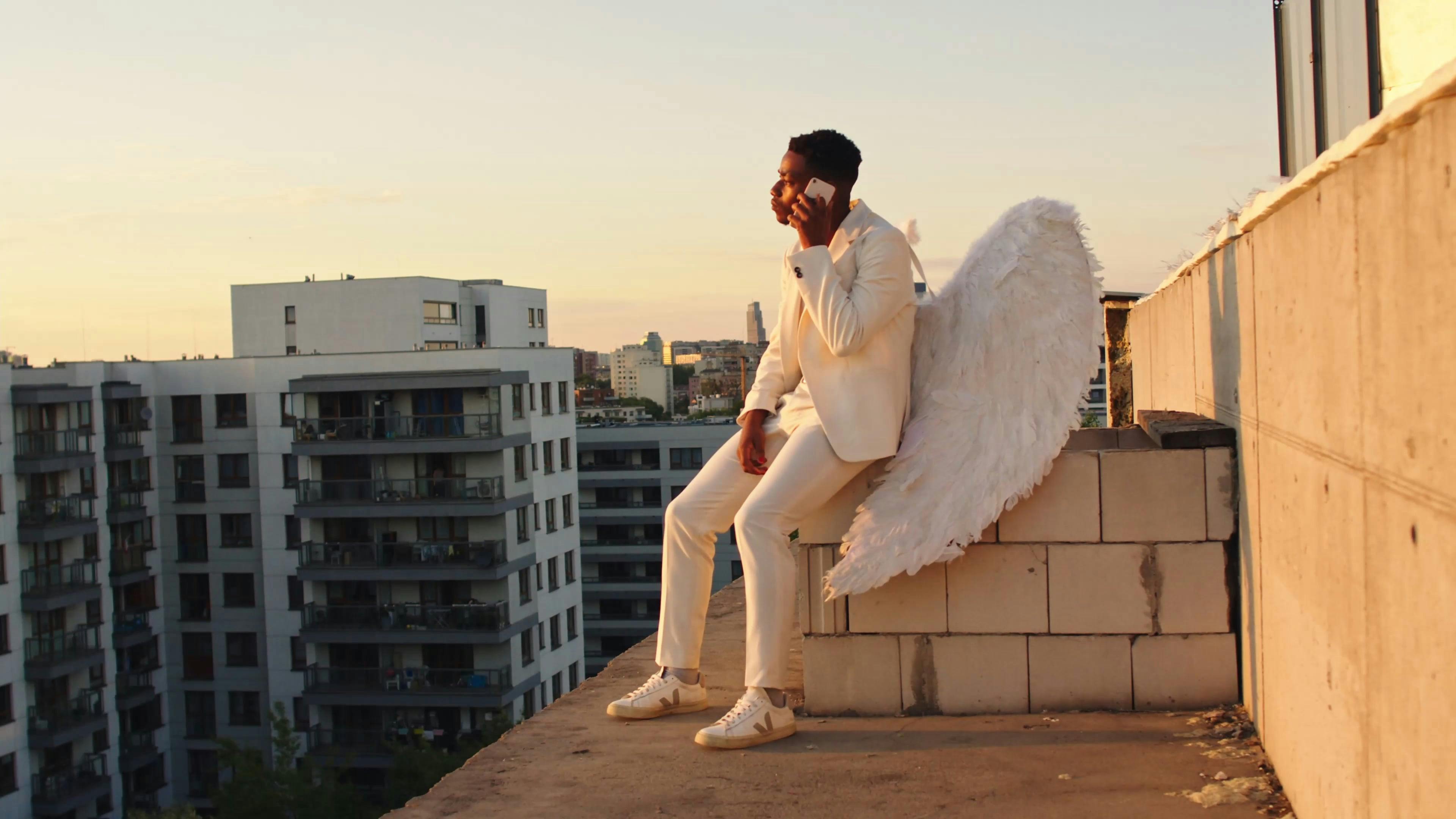 An Angel with a Cellphone · Free Stock Video