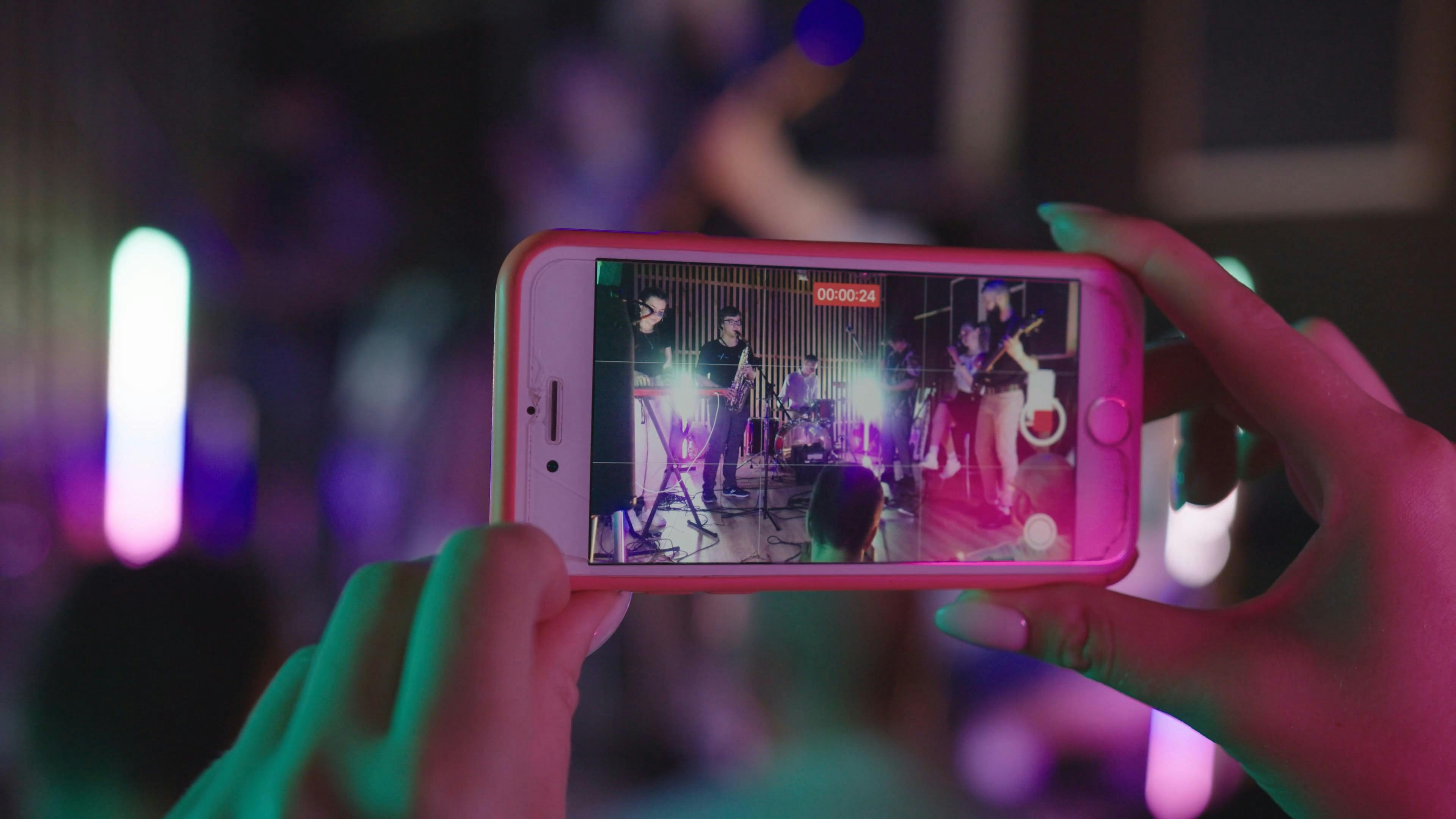 A Person Recording a Concert on a Phone Free Stock Video Footage ...