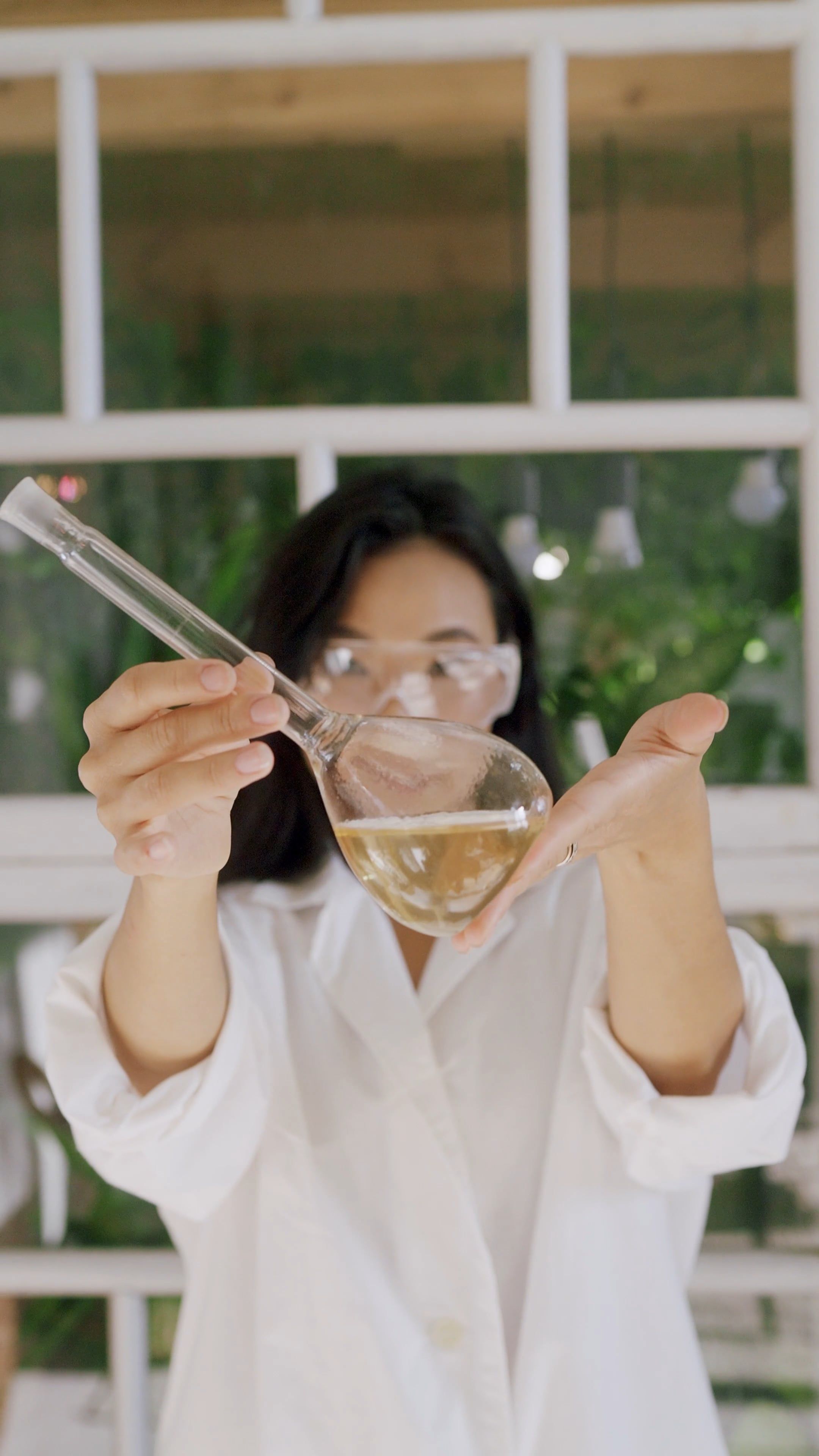 A Female Scientist Shaking a Volumetric Flask Free Stock Video Footage ...