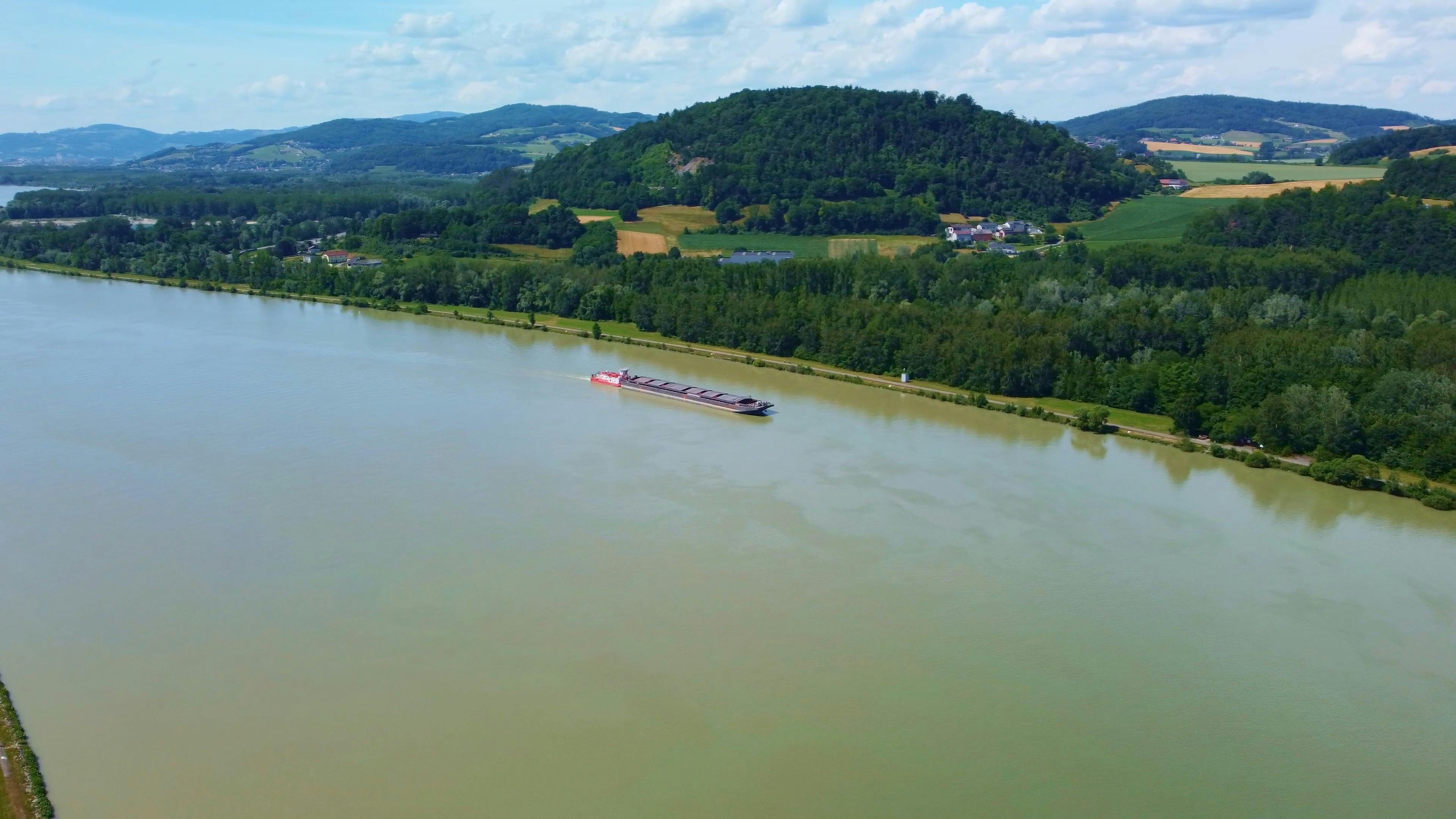 A Pusher Boat Pushing a Barge on a Scenic River Free Stock Video ...