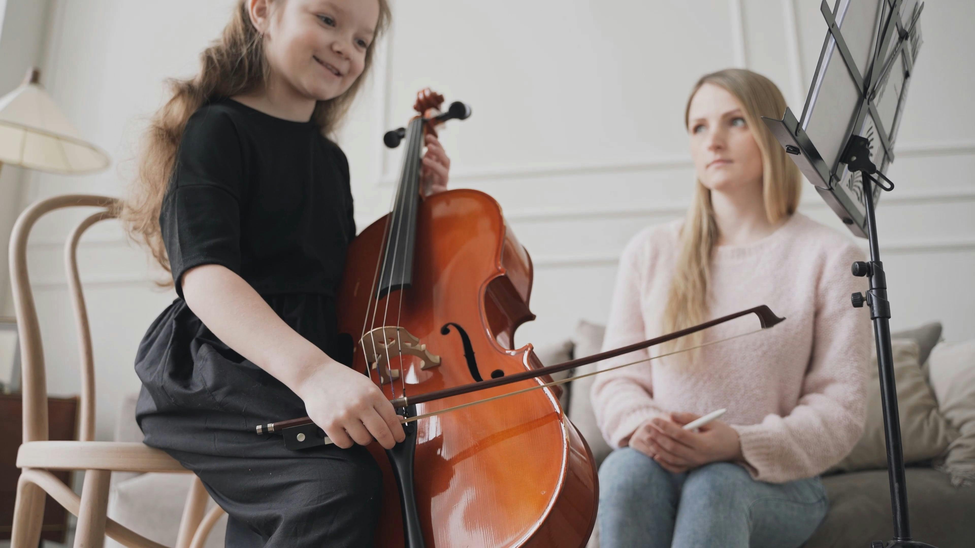 A Kid Having Her Cello Lessons Free Stock Video Footage, Royalty-Free ...