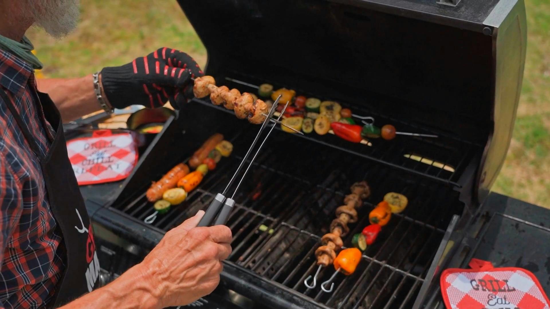 Person Grilling Food · Free Stock Video